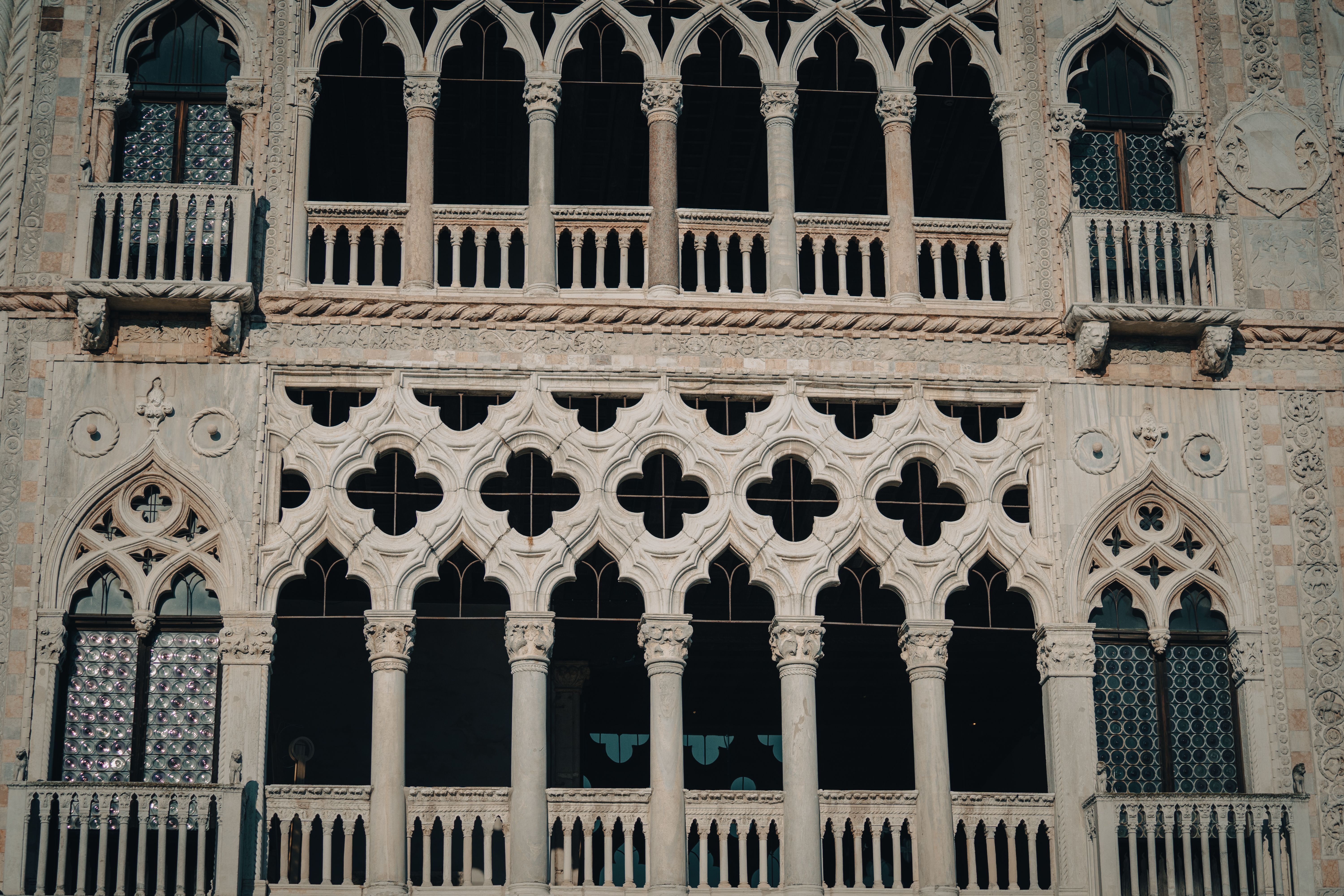 Arches on Facade of Gothic Building · Free Stock Photo