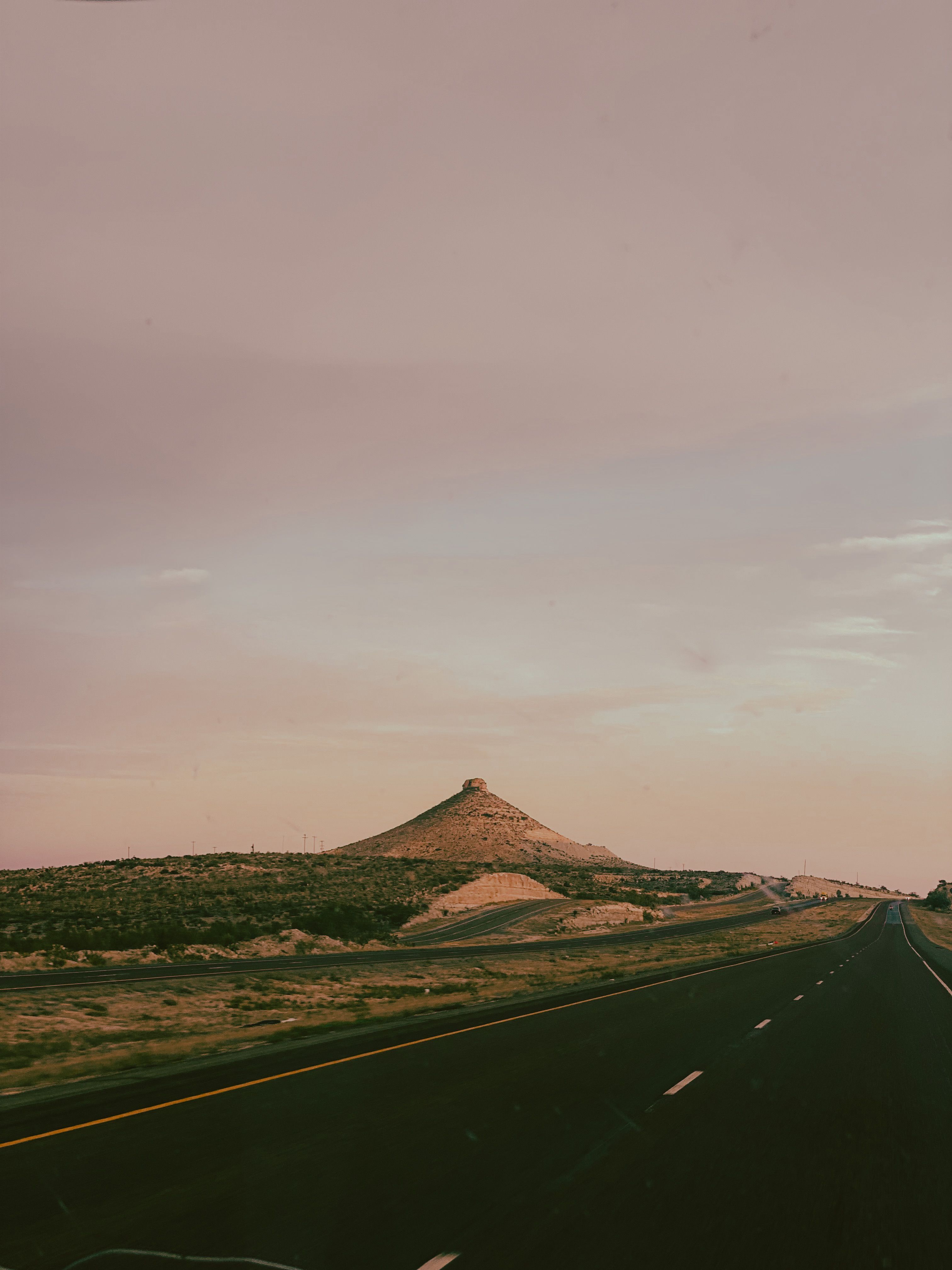 Empty Road Under Dark Clouds · Free Stock Photo