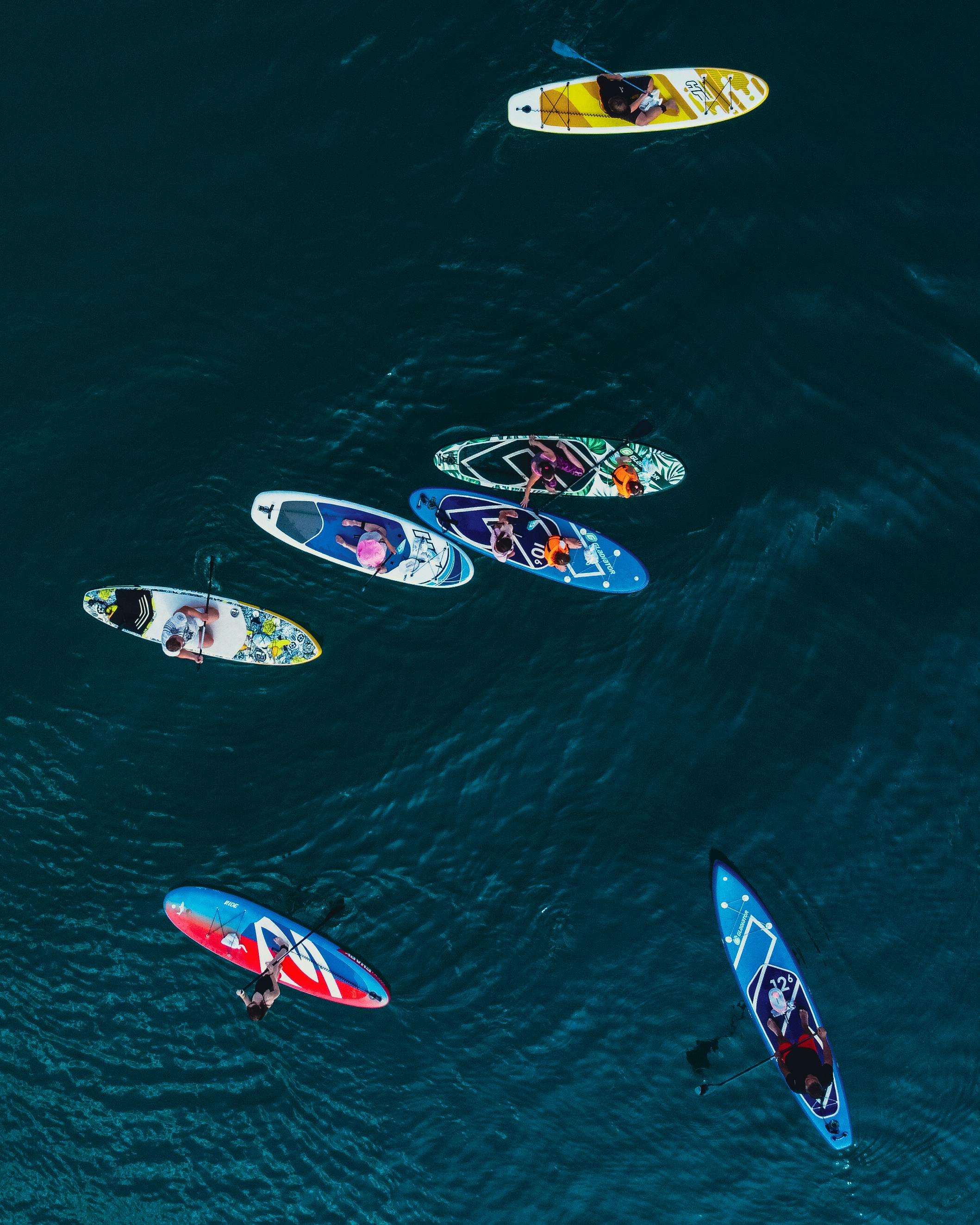 Aerial Photo of People on Paddle Boards · Free Stock Photo