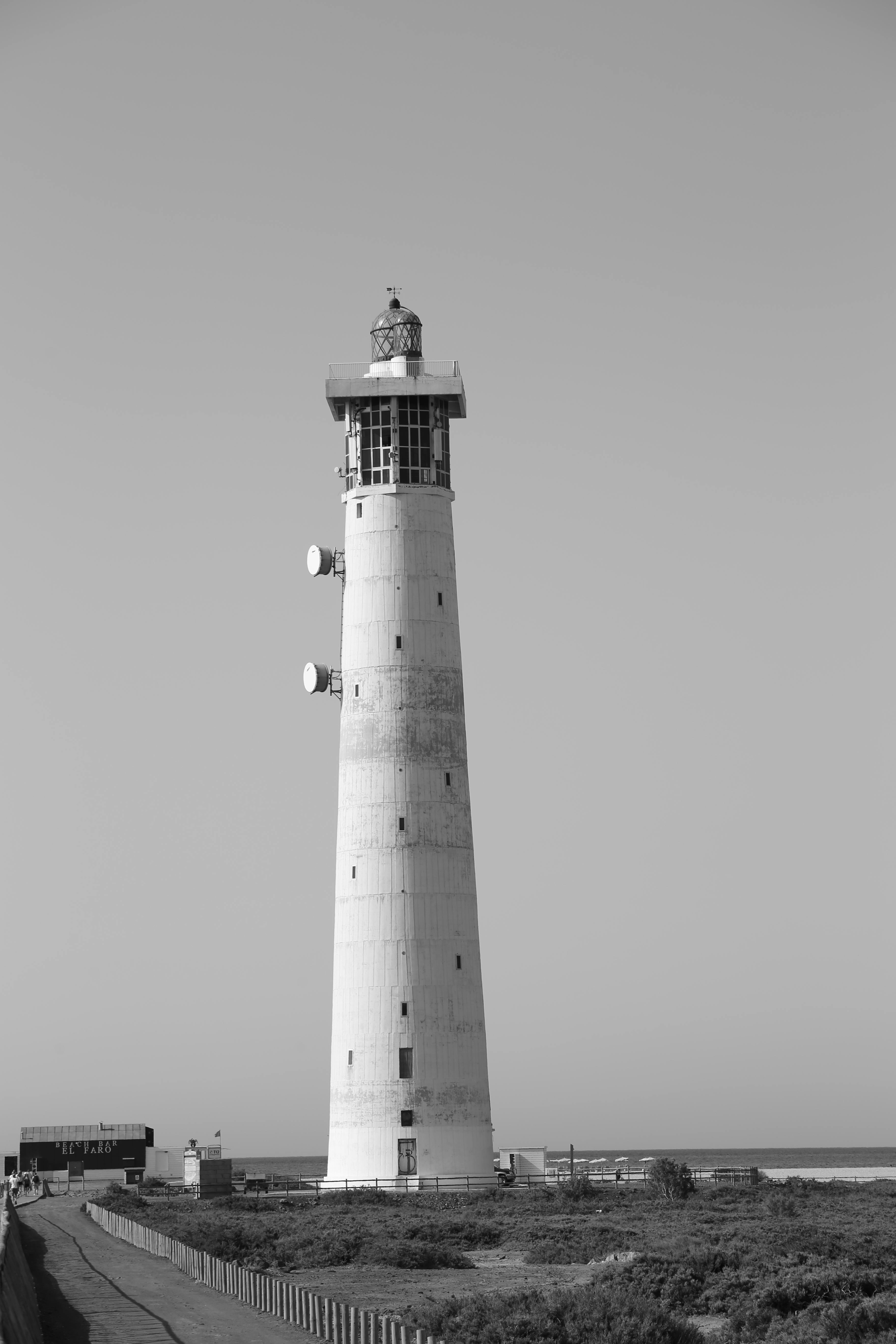 Lighthouse in Sea Water · Free Stock Photo