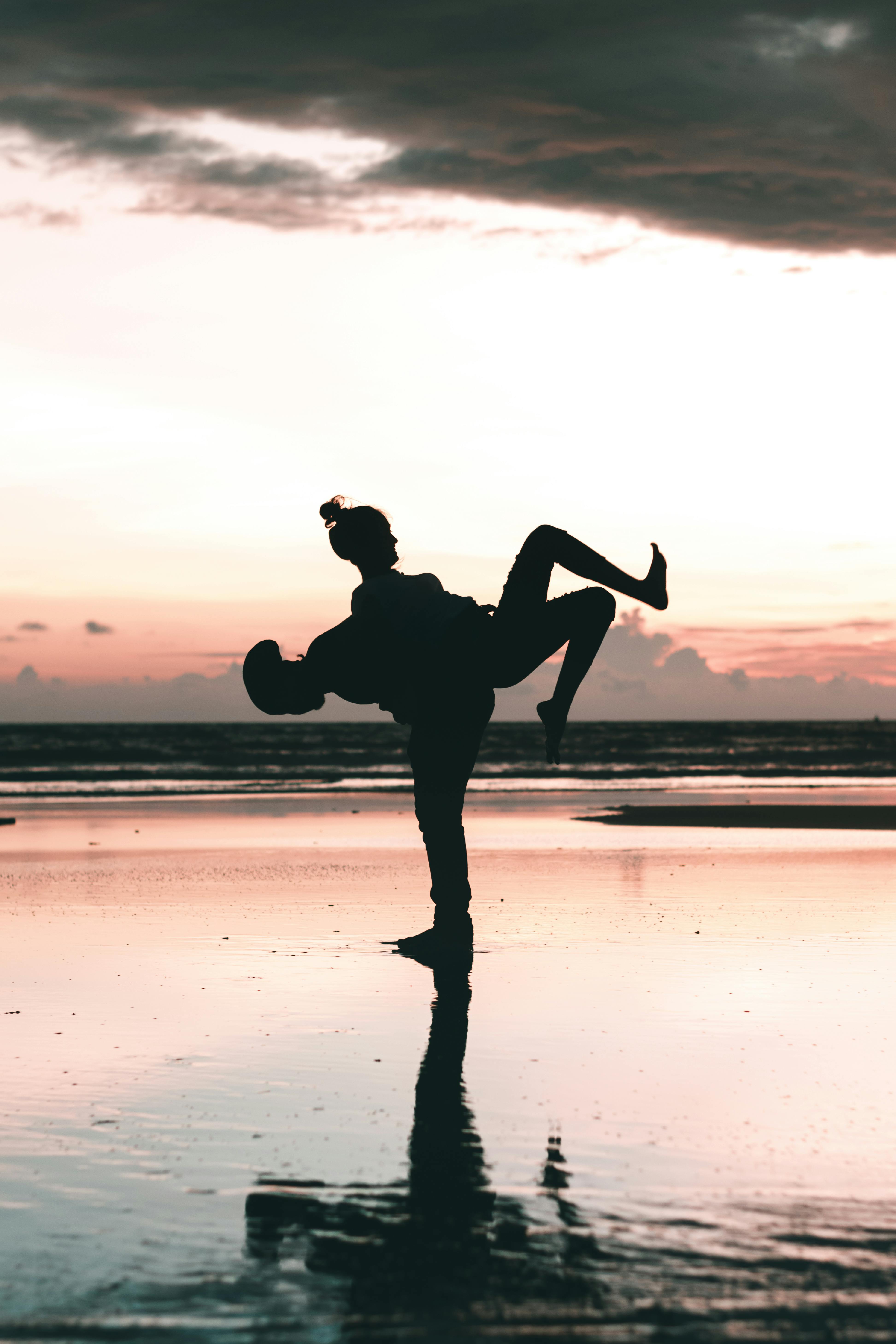 Person playing Ball on Beachside · Free Stock Photo