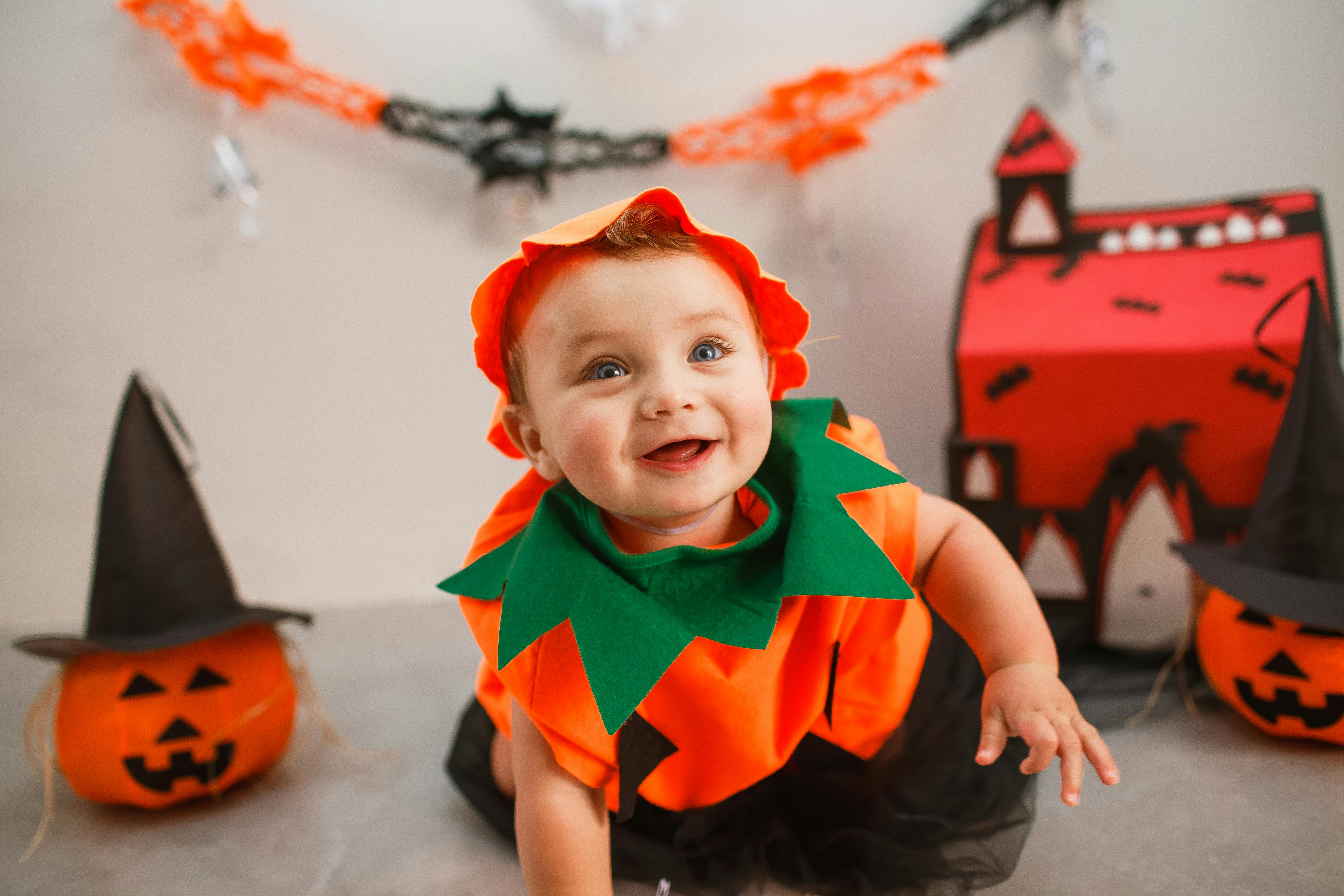 A Child Wearing a Halloween Costume · Free Stock Photo