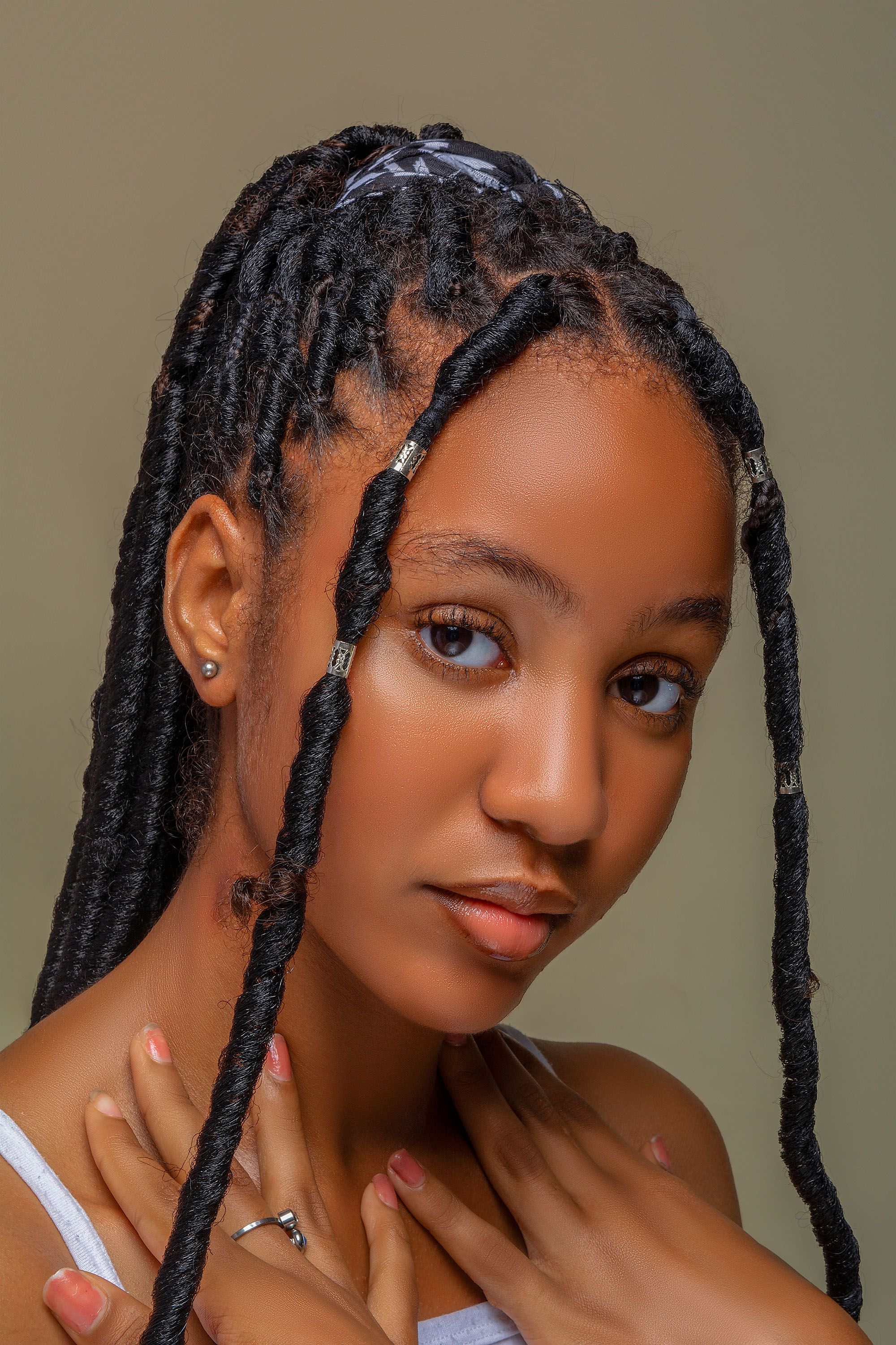 Portrait of Young Woman with Dreadlocks Wearing Glasses · Free Stock Photo