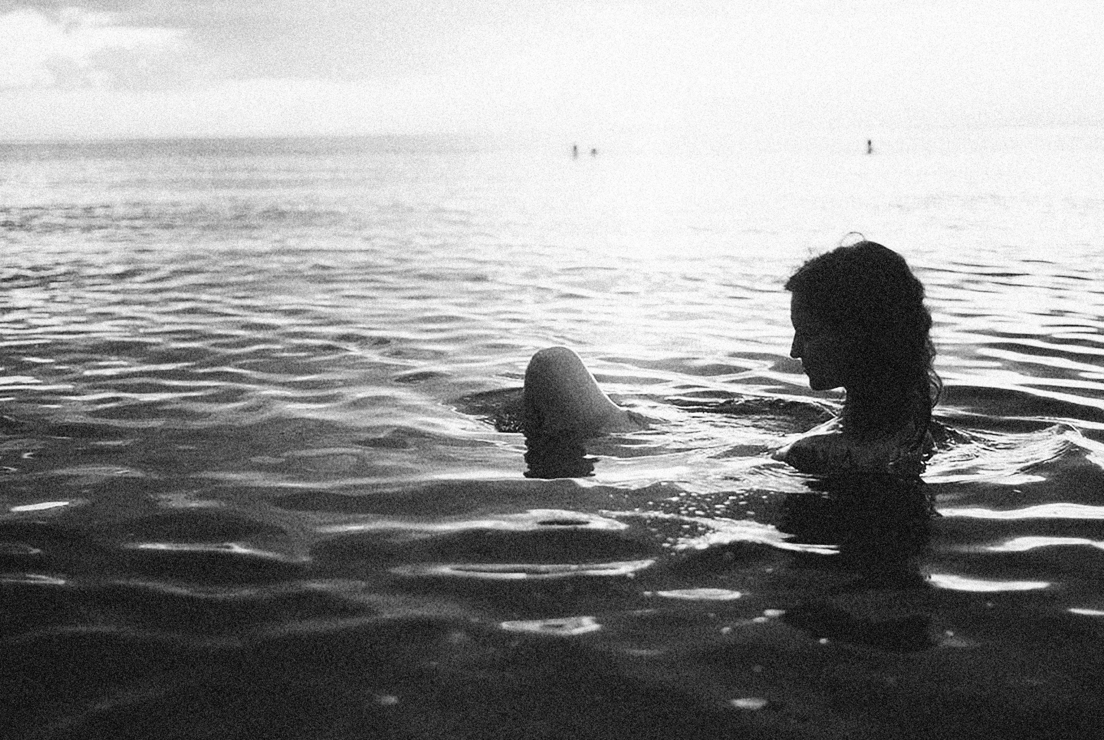 A Woman Soaking into the Sea · Free Stock Photo