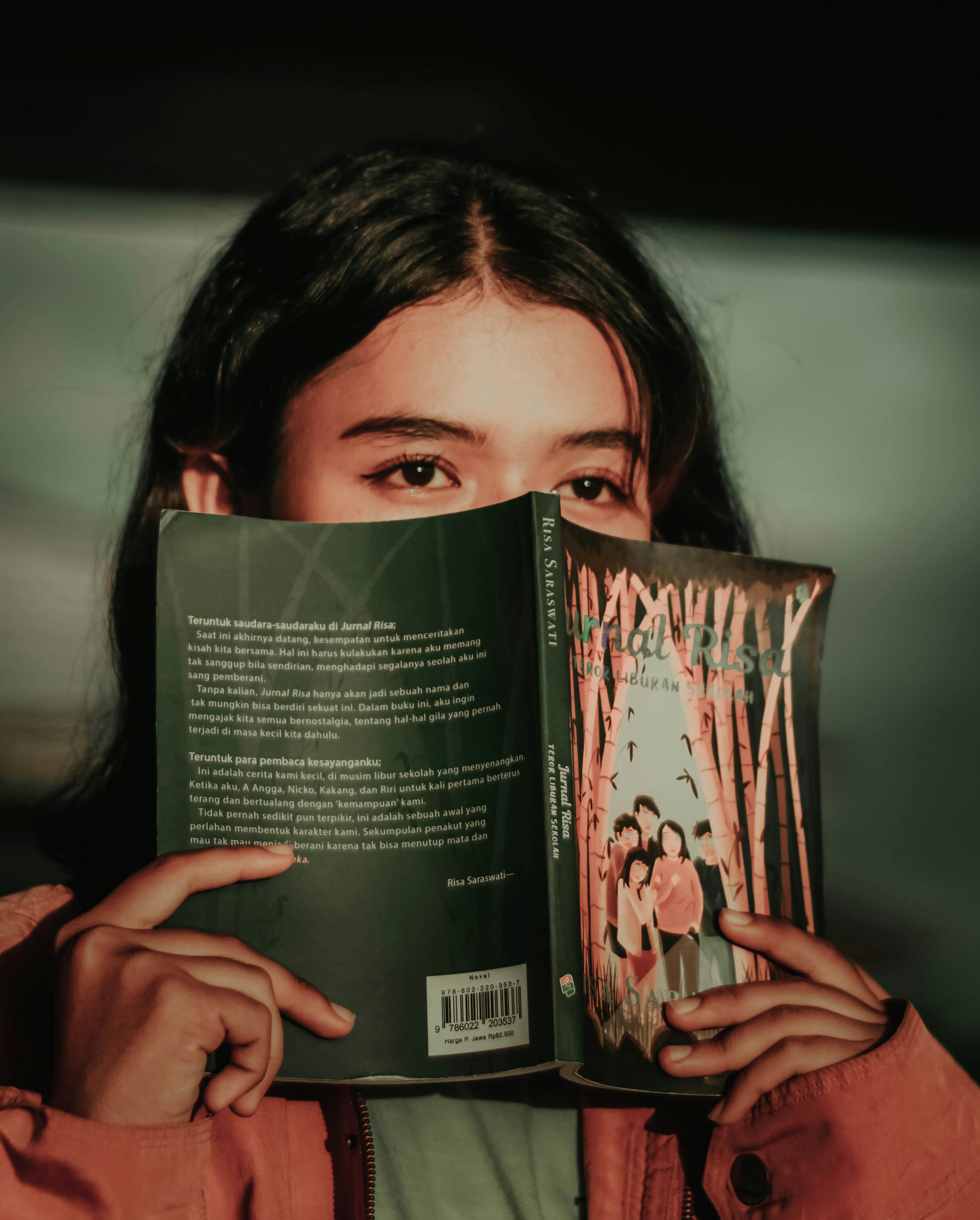 Woman Covering Her face with a Book · Free Stock Photo