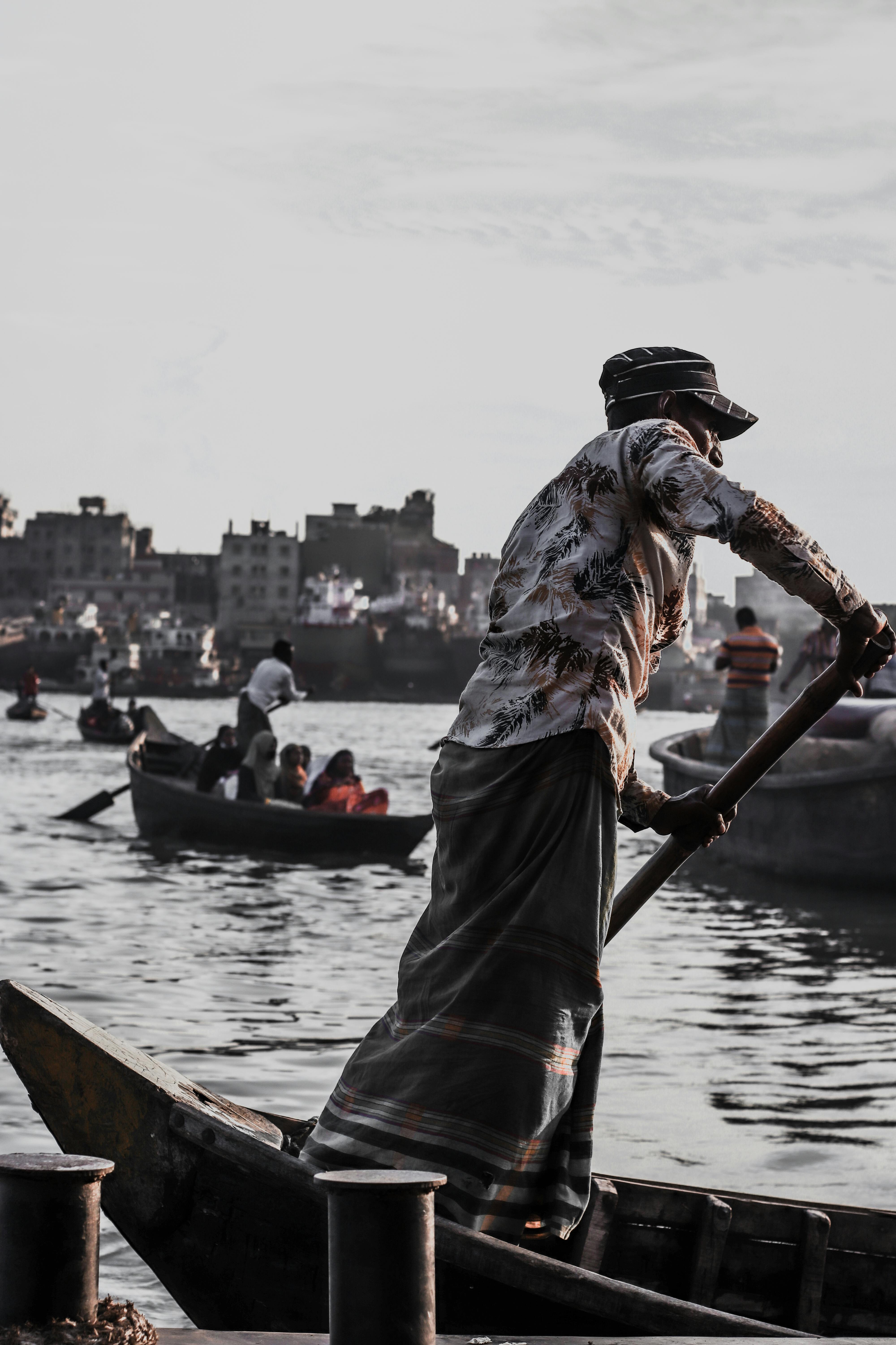 Fisherman Rowing Boat in Bangladesh · Free Stock Photo