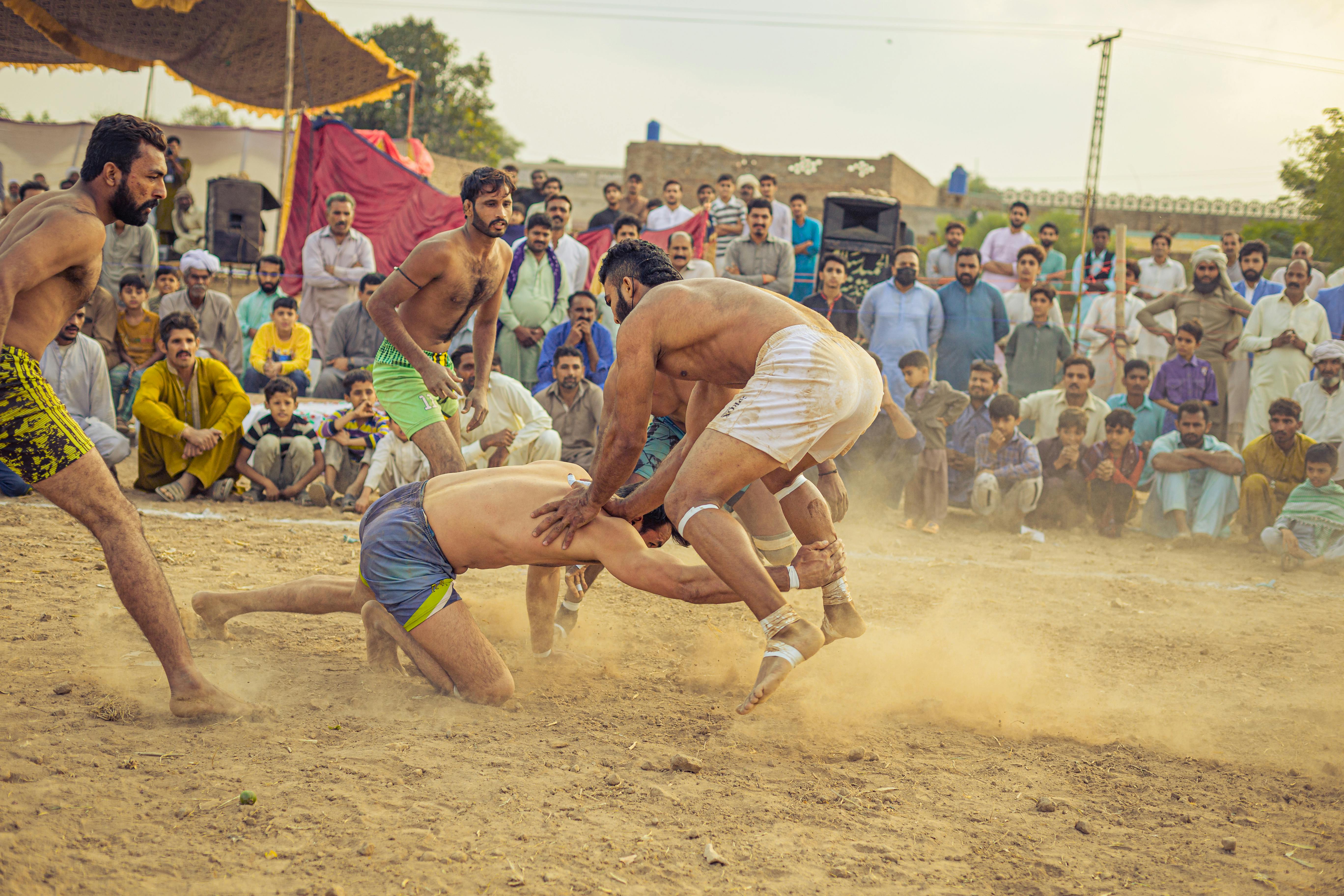 People Playing Game on Sand · Free Stock Photo