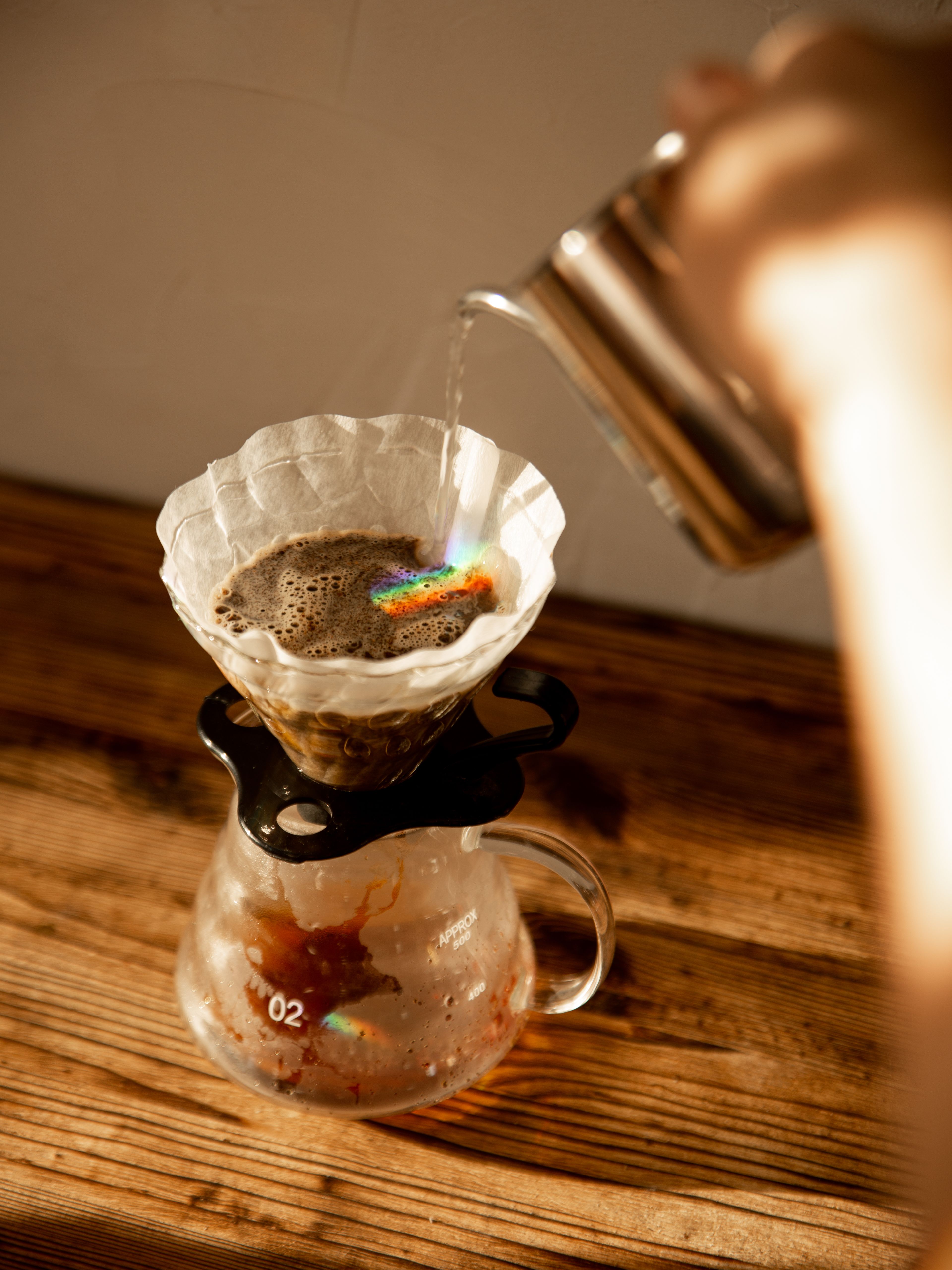 Person Pouring Water to a Filter to Make Coffee · Free Stock Photo