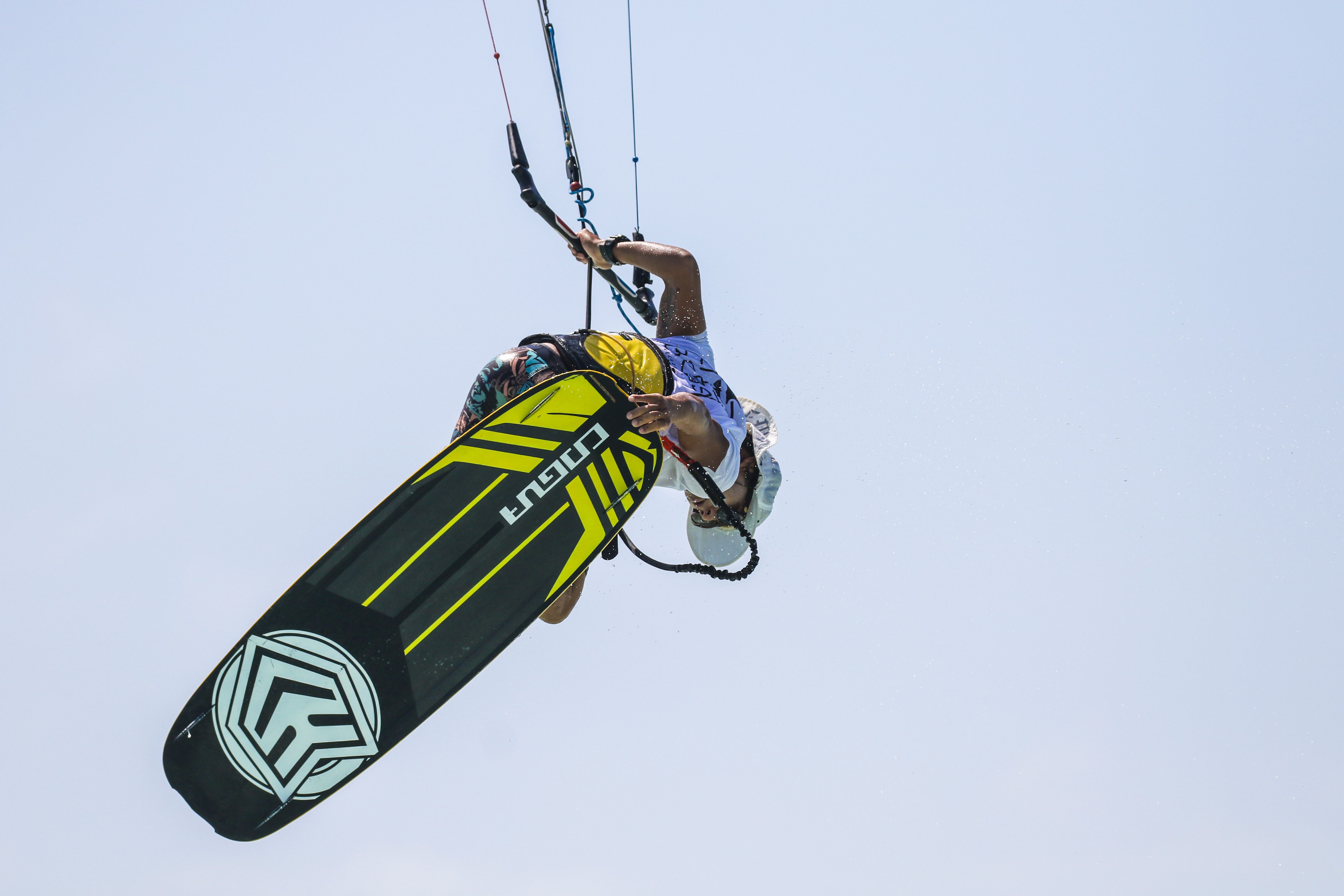 Person on a Kiteboard Doing Kite Surfing · Free Stock Photo