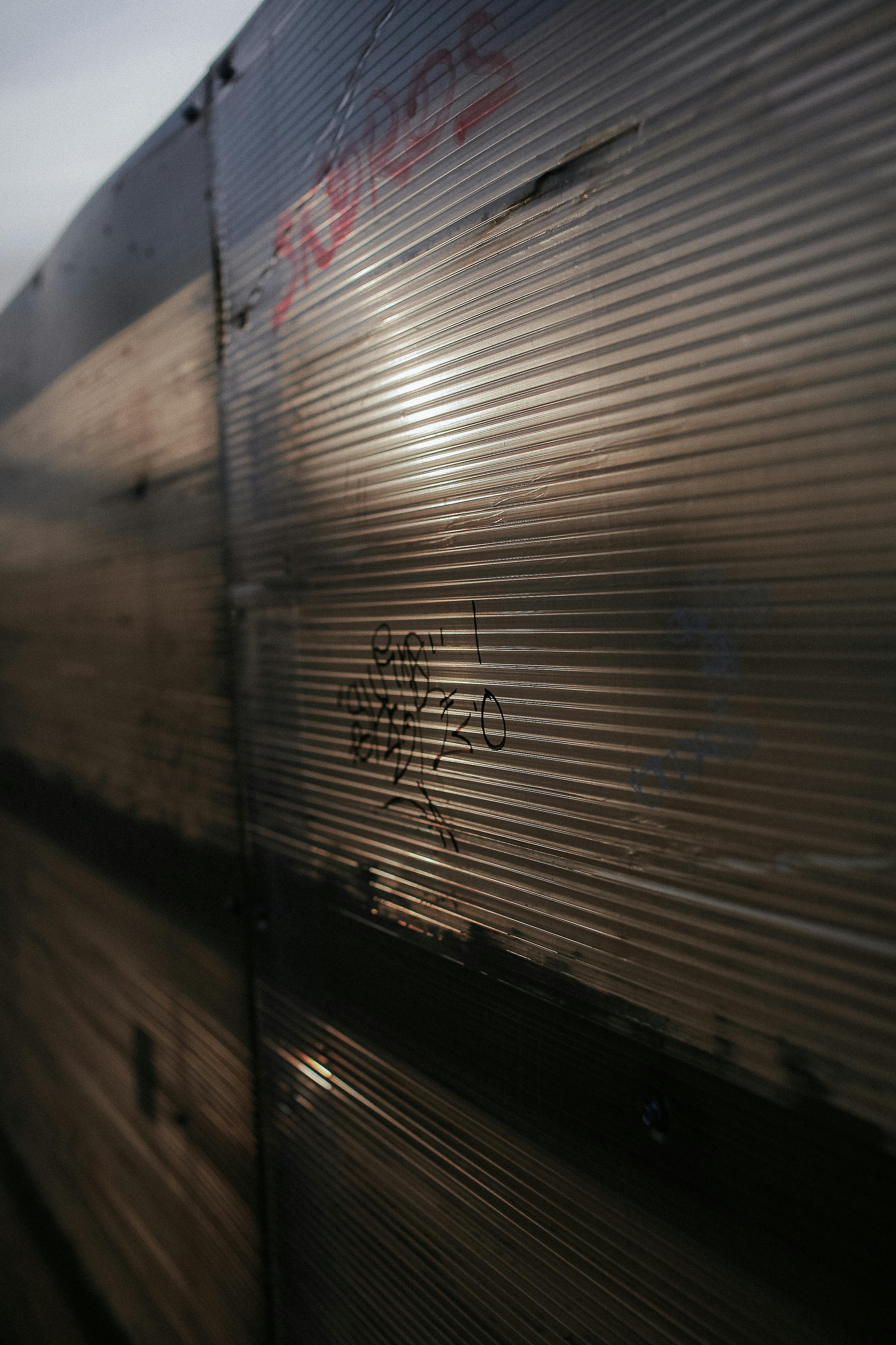 Graffiti on Metal Wall · Free Stock Photo