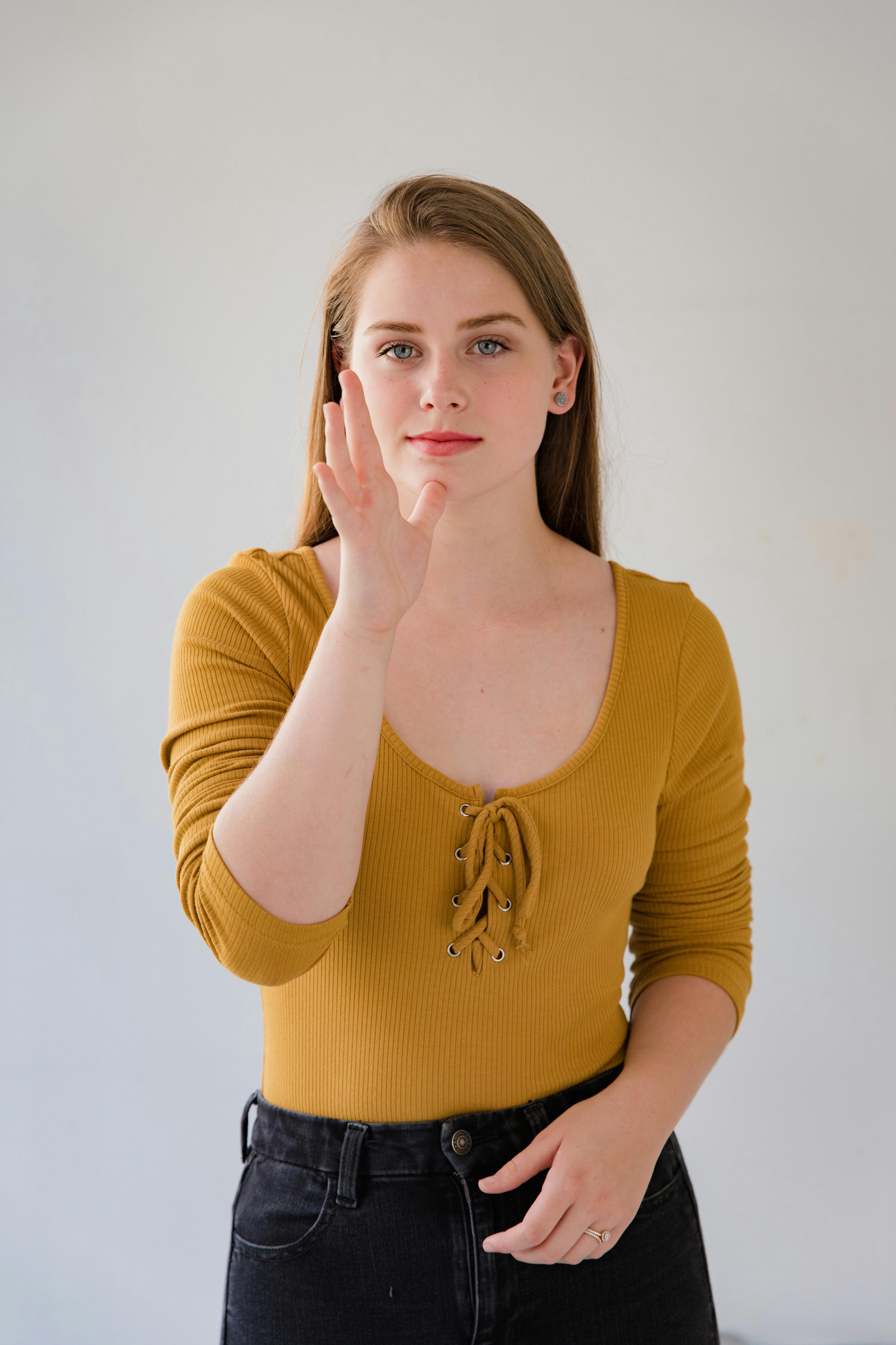 Portrait of Woman Showing Sign Language · Free Stock Photo