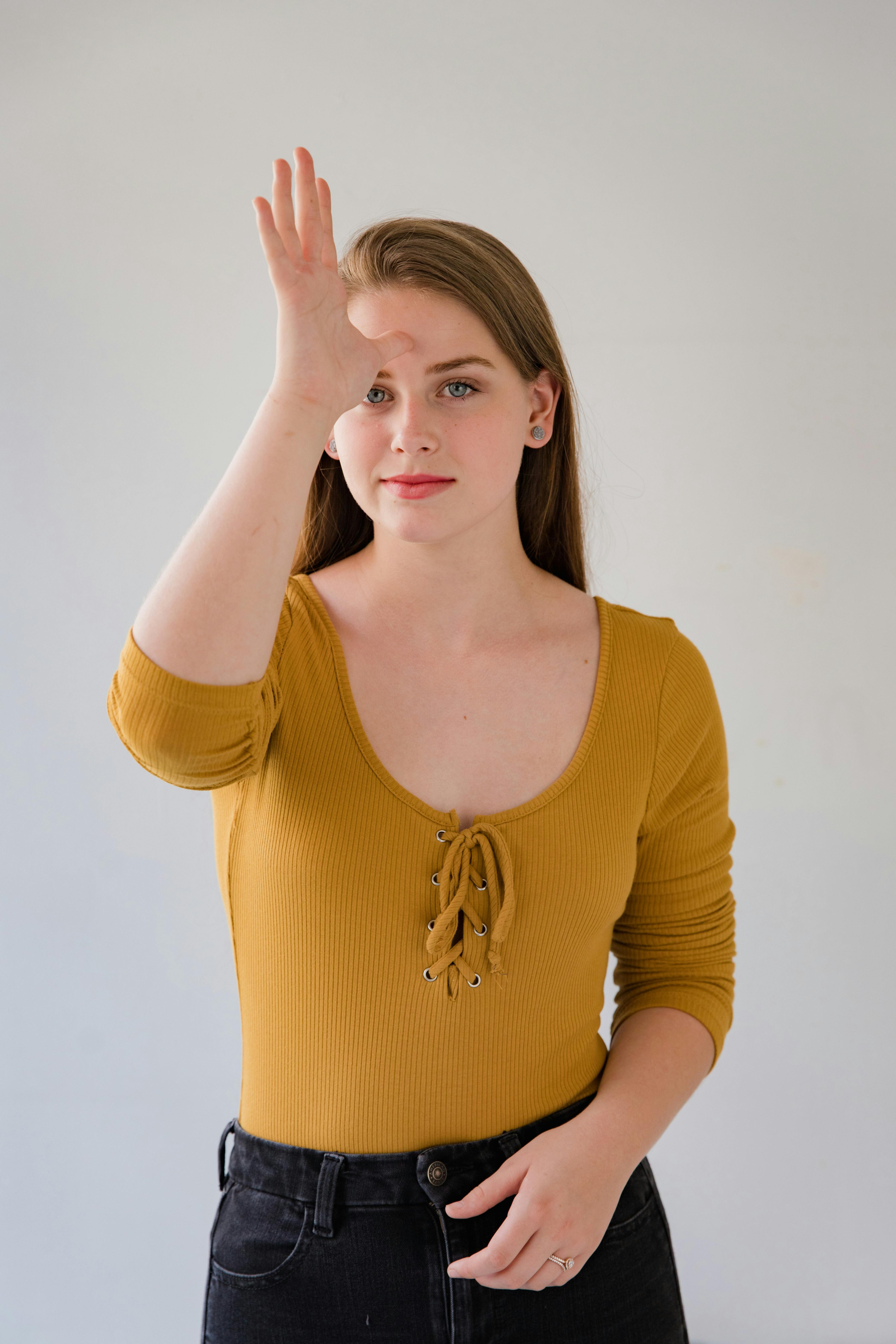 Woman Showing Sign Language Gesture · Free Stock Photo