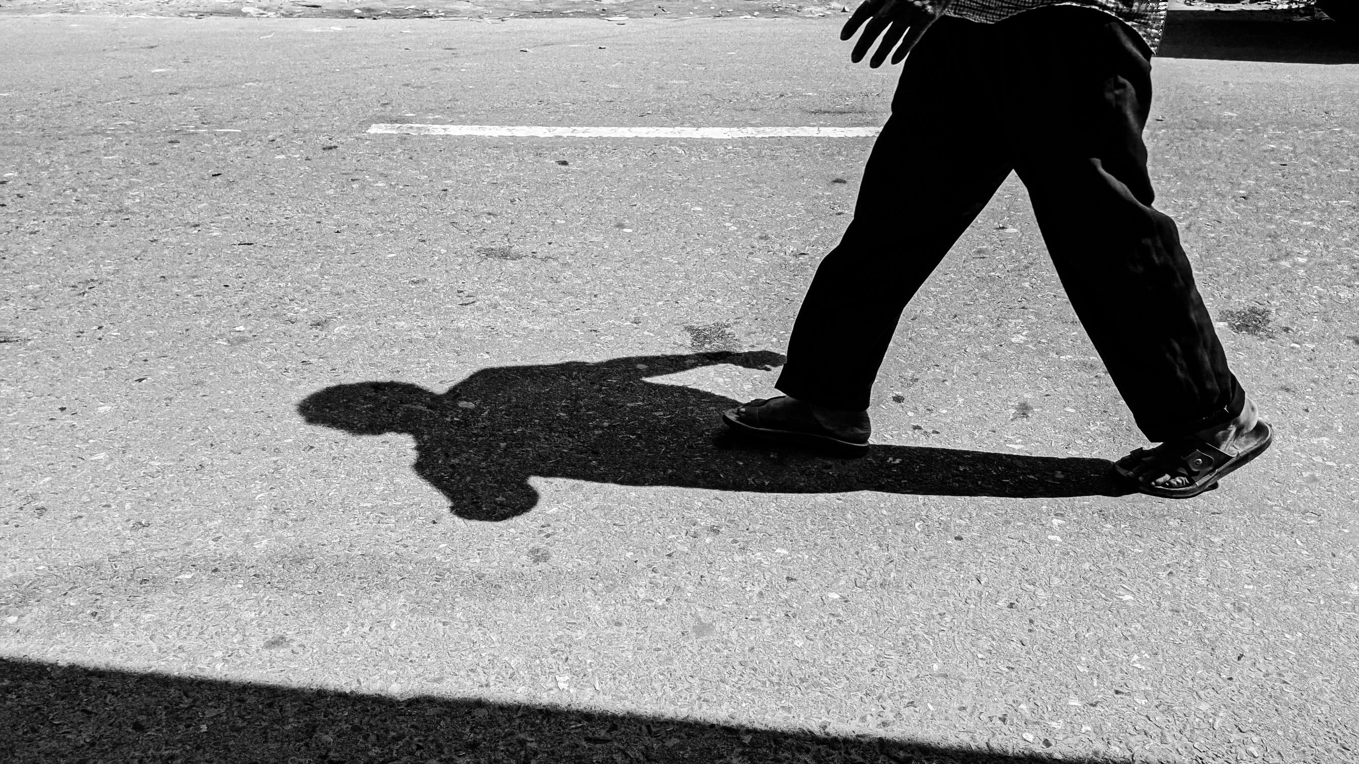 Person Walking on Street · Free Stock Photo