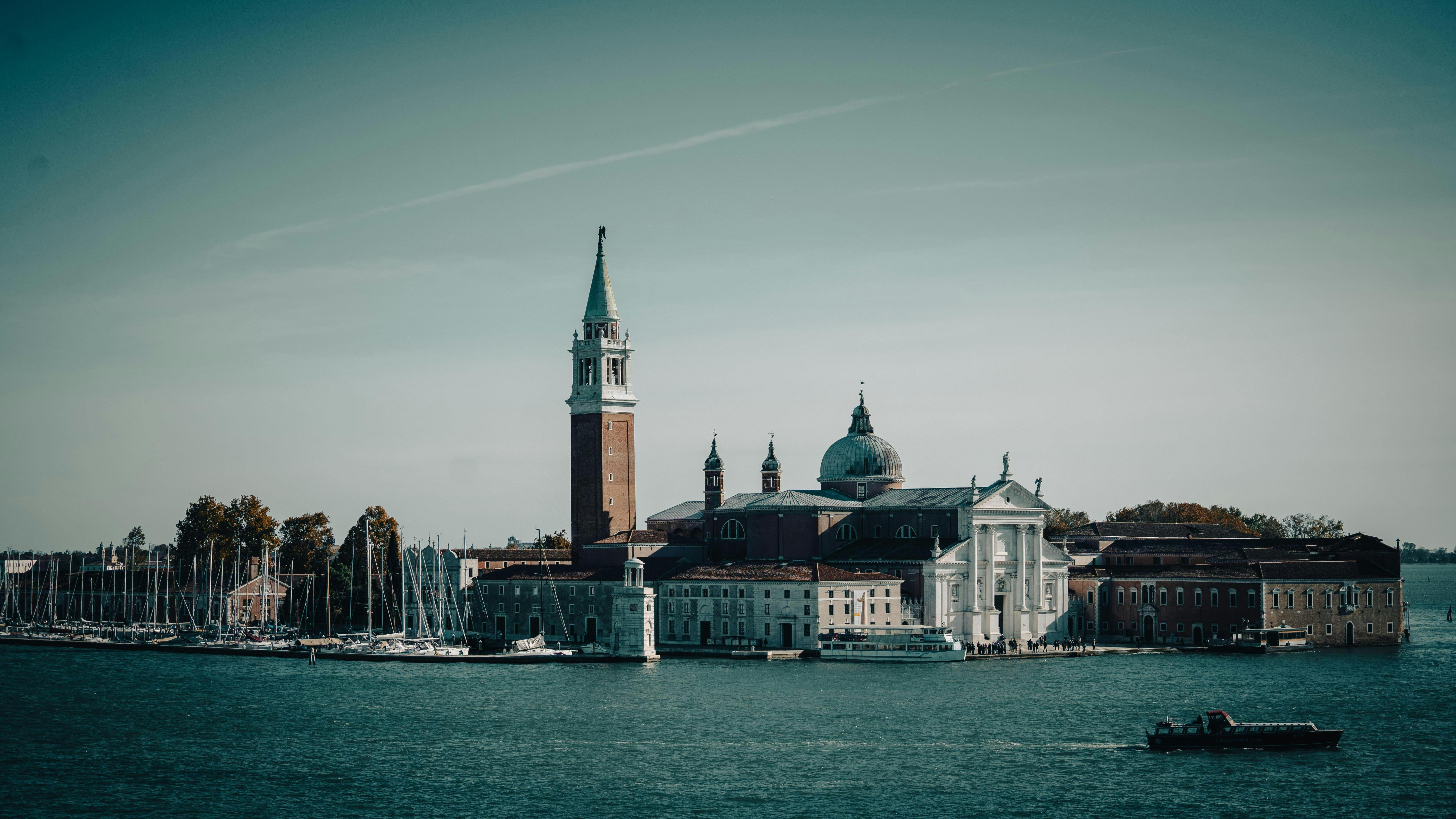 Historic Buildings on Coast in Water · Free Stock Photo