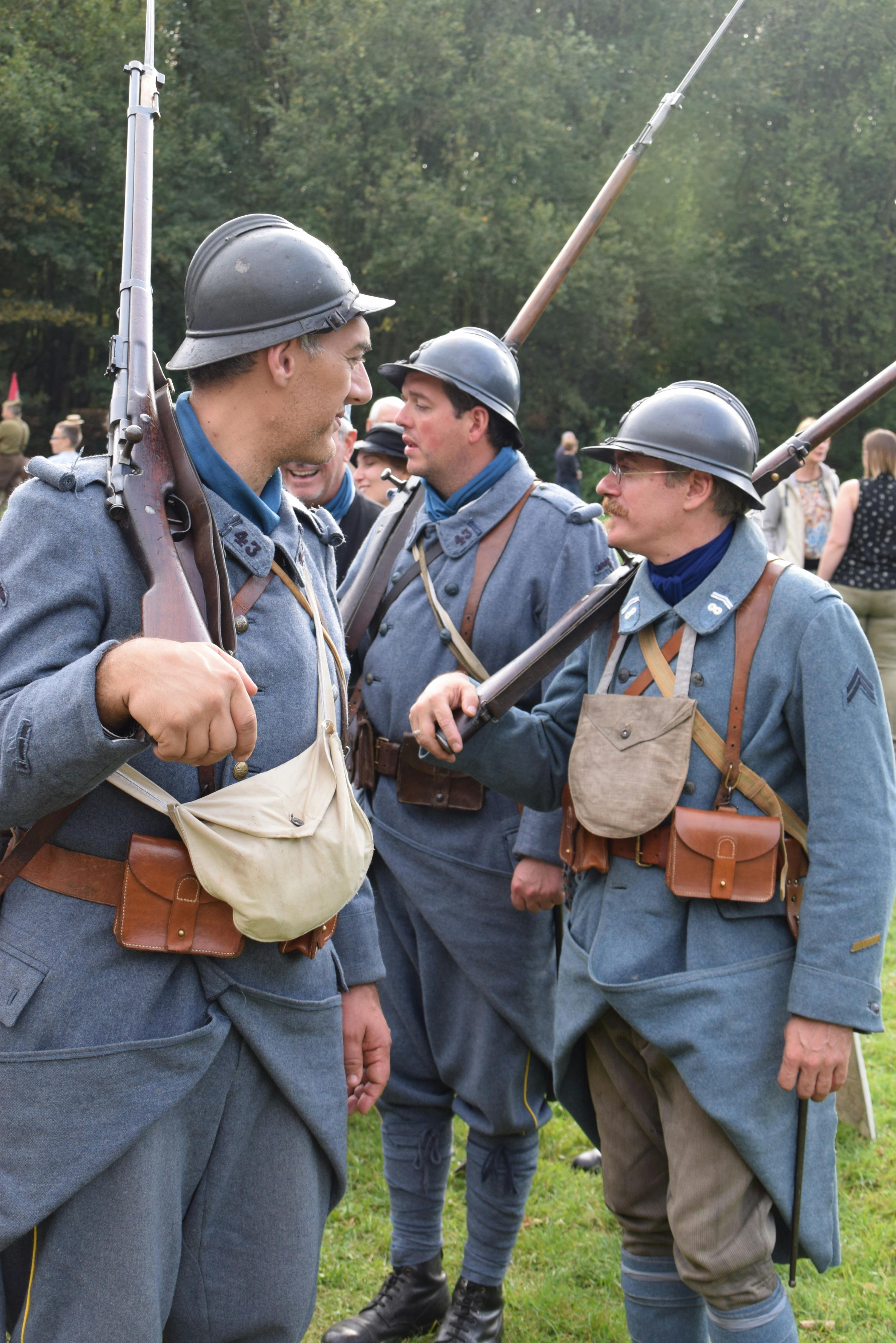 Group of Men Holding Rifles · Free Stock Photo