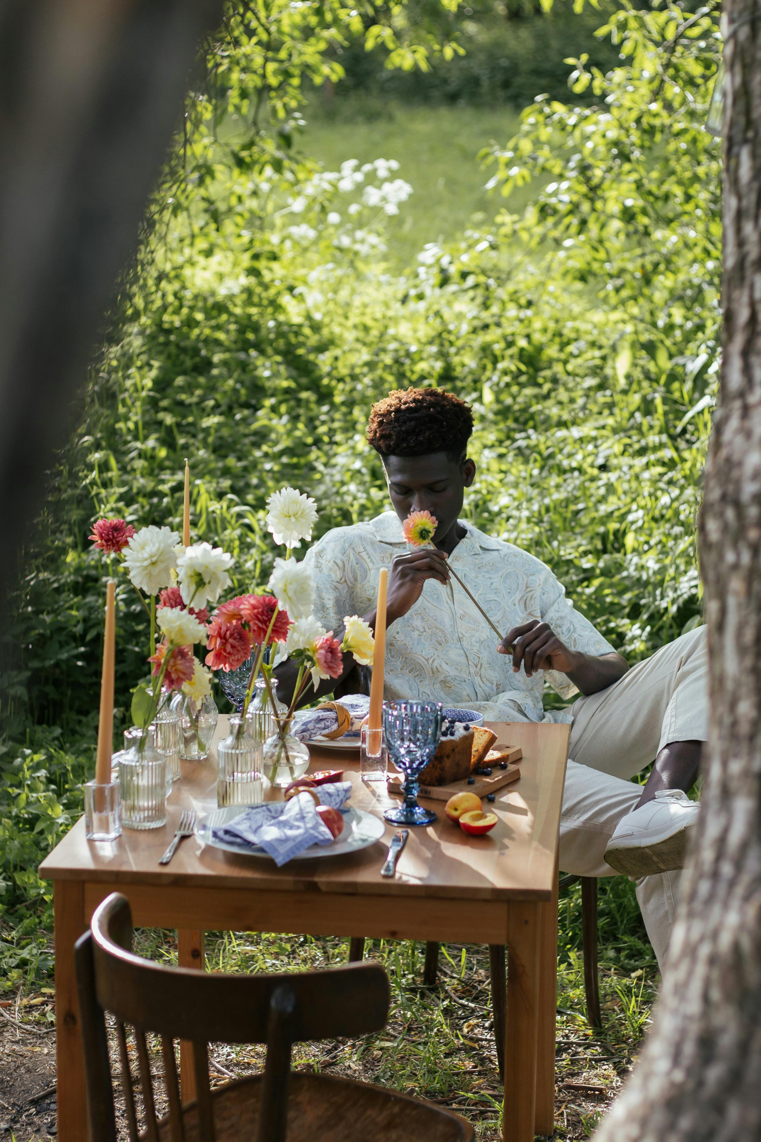 A Man Sitting at the Table · Free Stock Photo