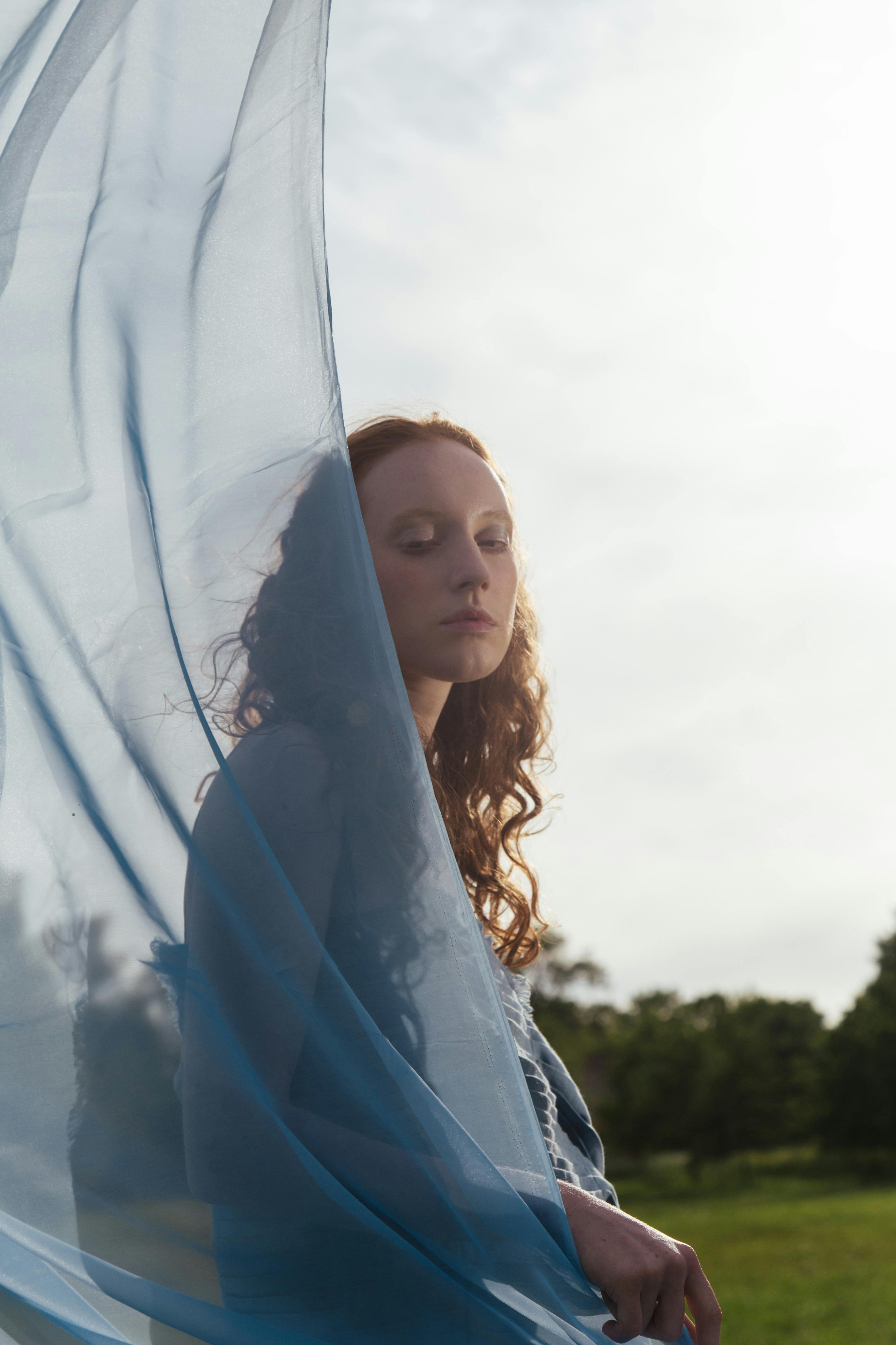 A Woman Draped in Chiffon Fabric · Free Stock Photo