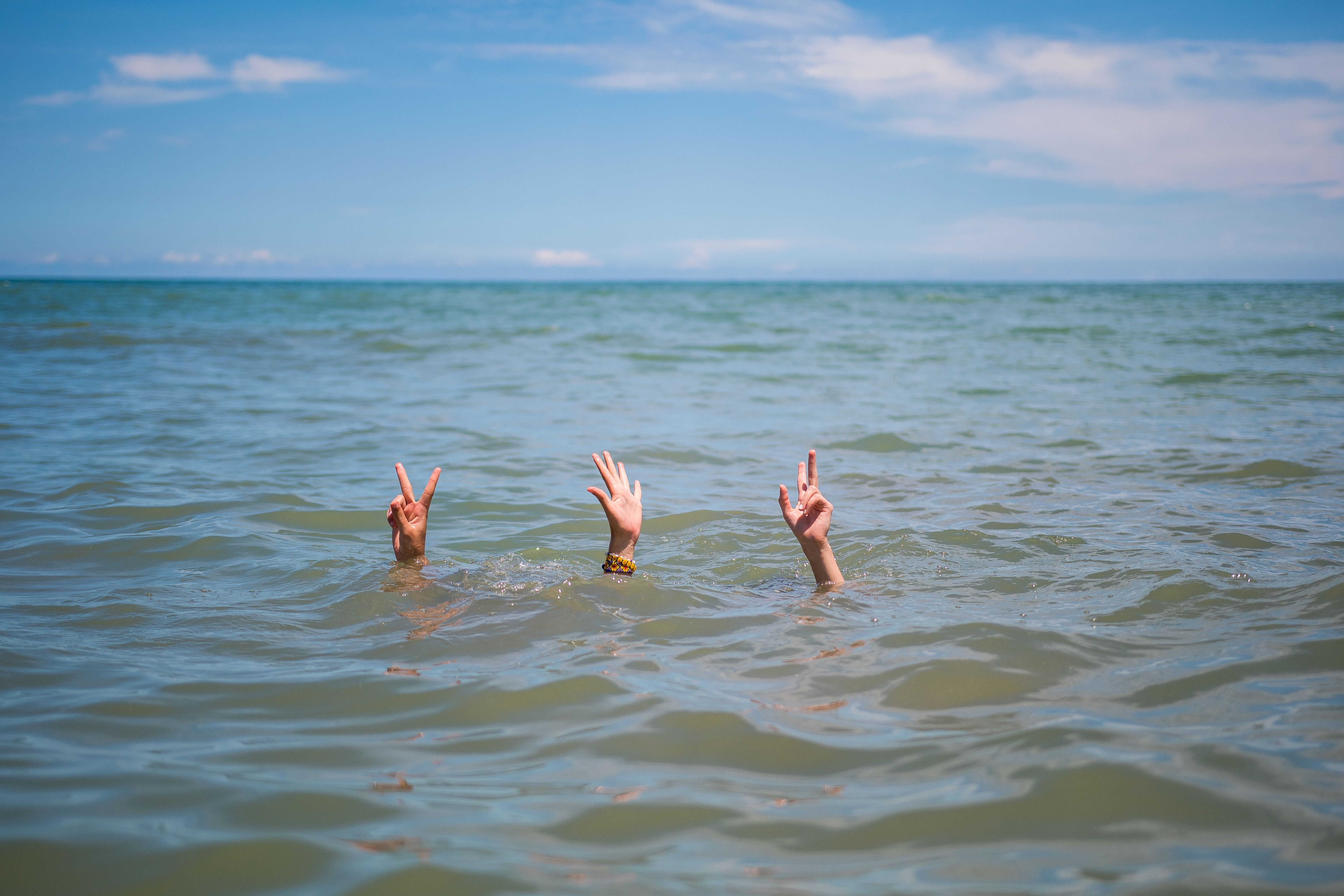 Human Hands over Water · Free Stock Photo