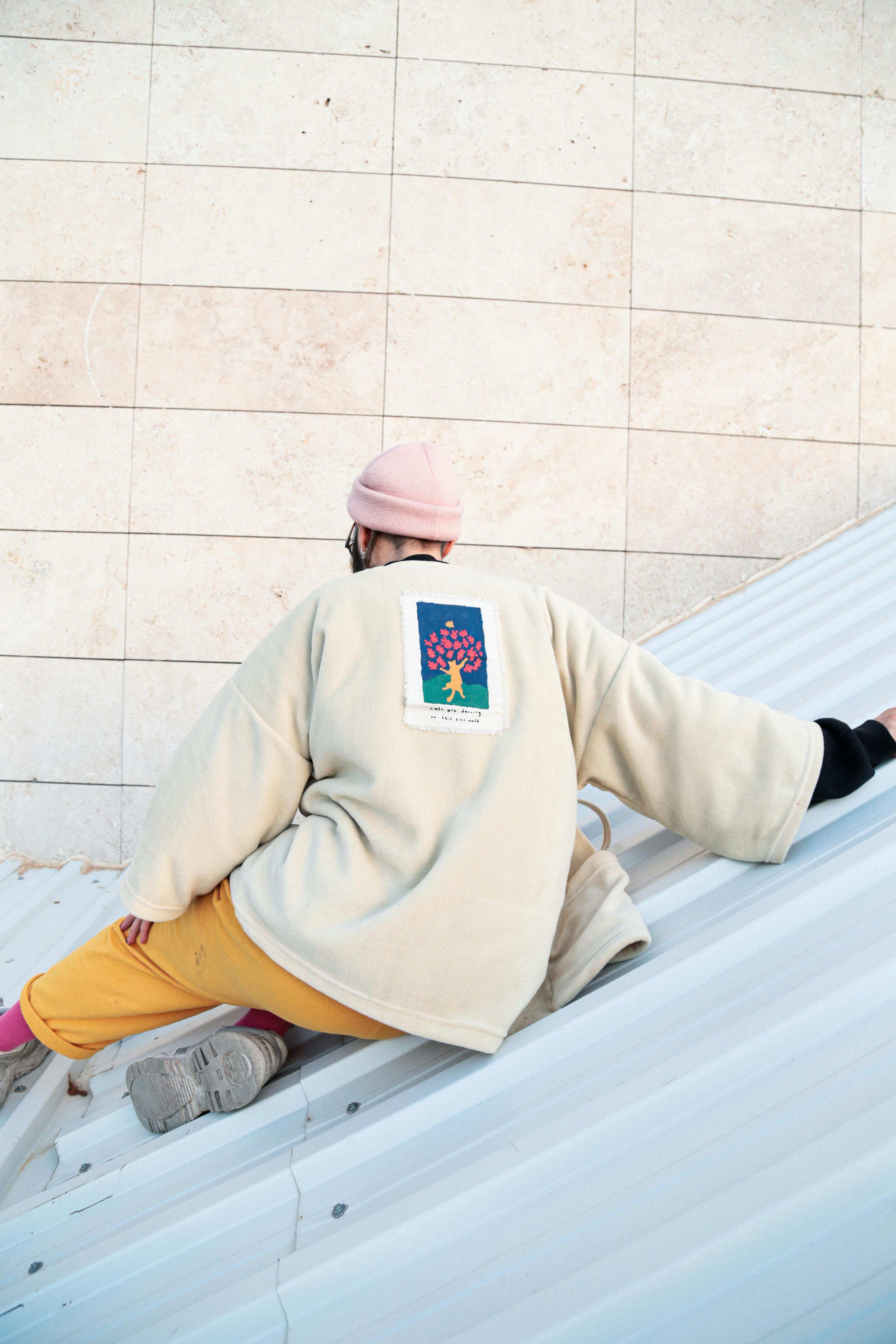 A Man Standing In Between Buildings · Free Stock Photo