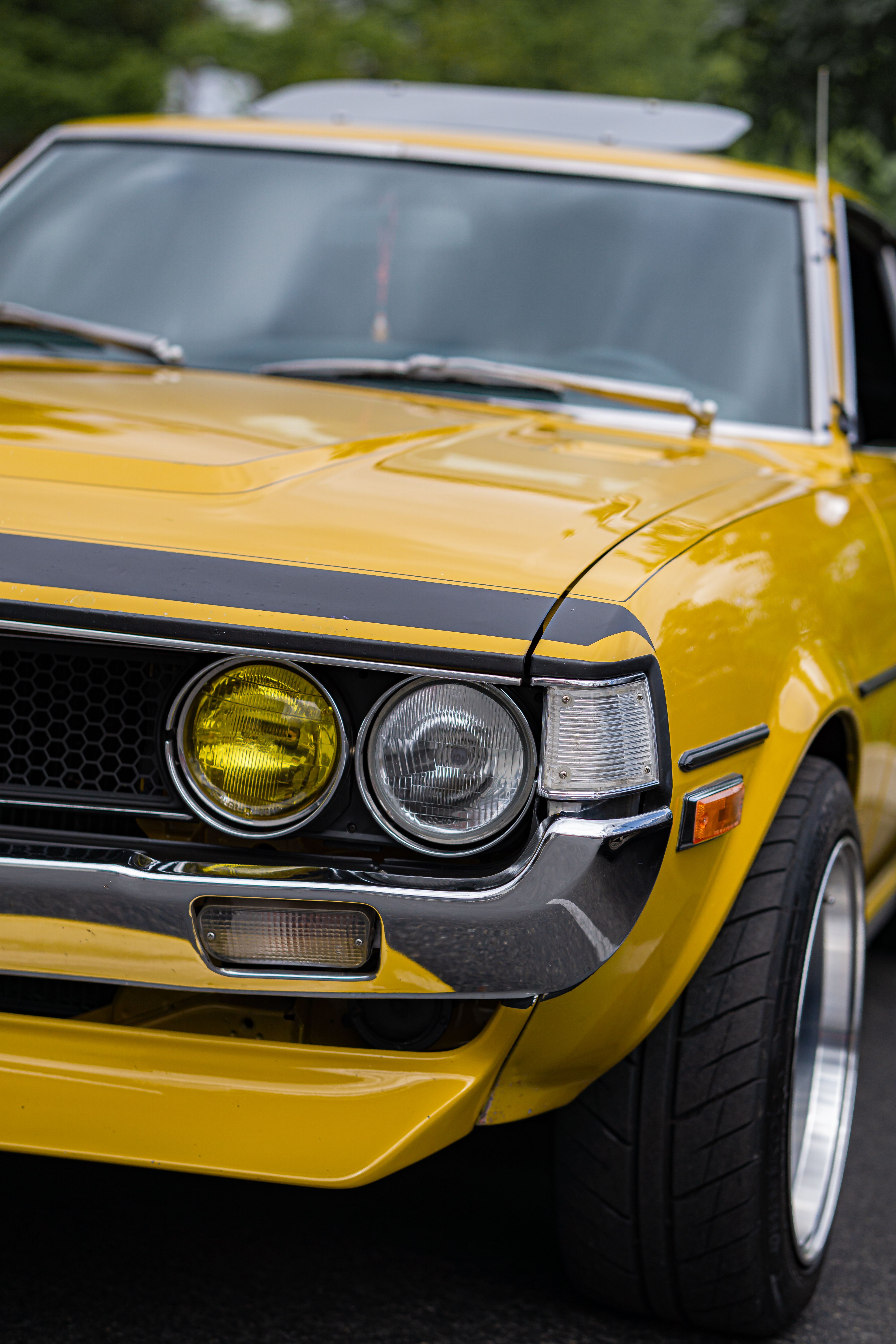Yellow Car in Close Up Photography · Free Stock Photo