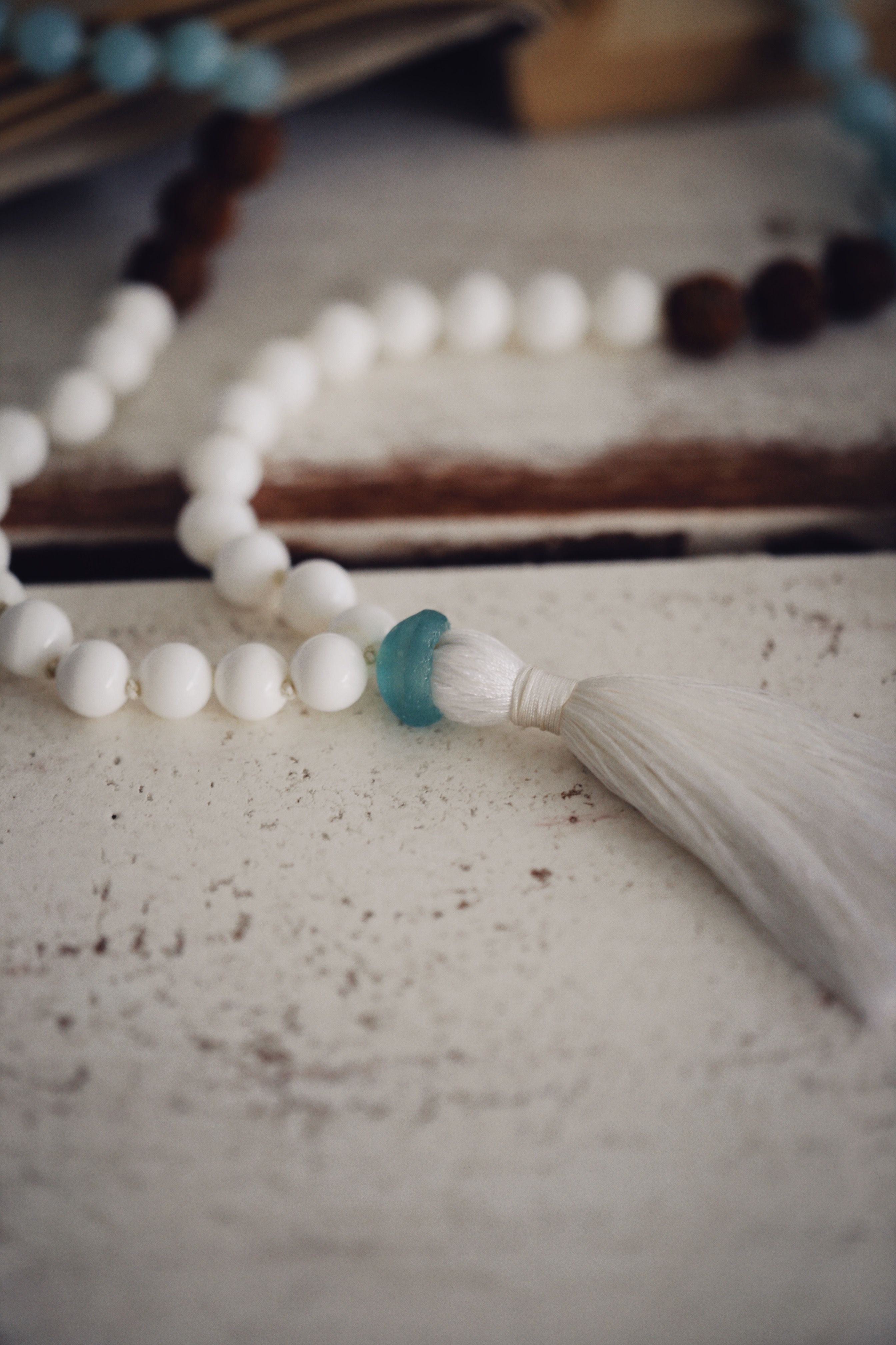 Person with Praying Hands Wearing Mala Beaded Necklace Gold Bracelet ...