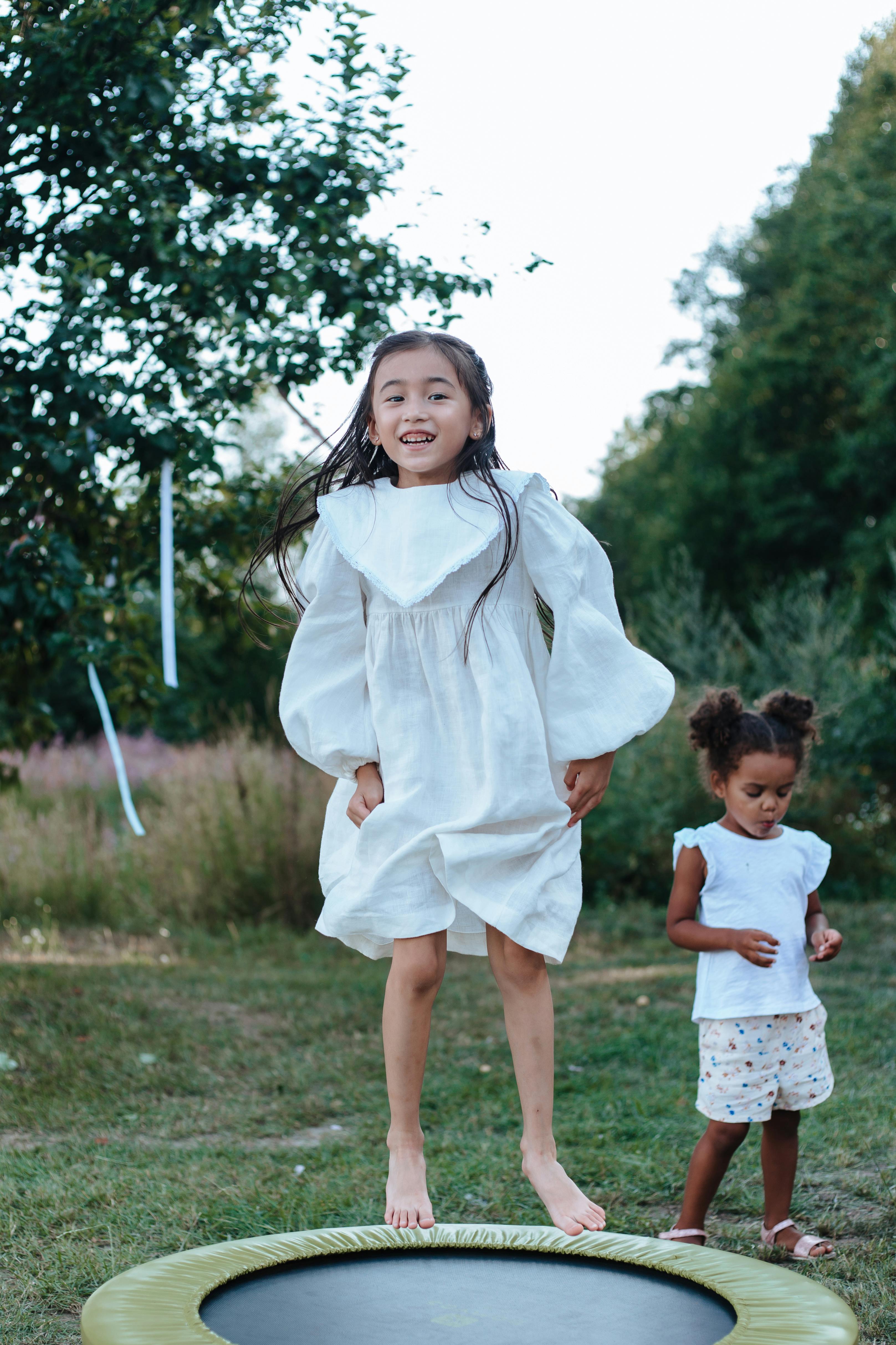 Kids Playing in the Backyard · Free Stock Photo