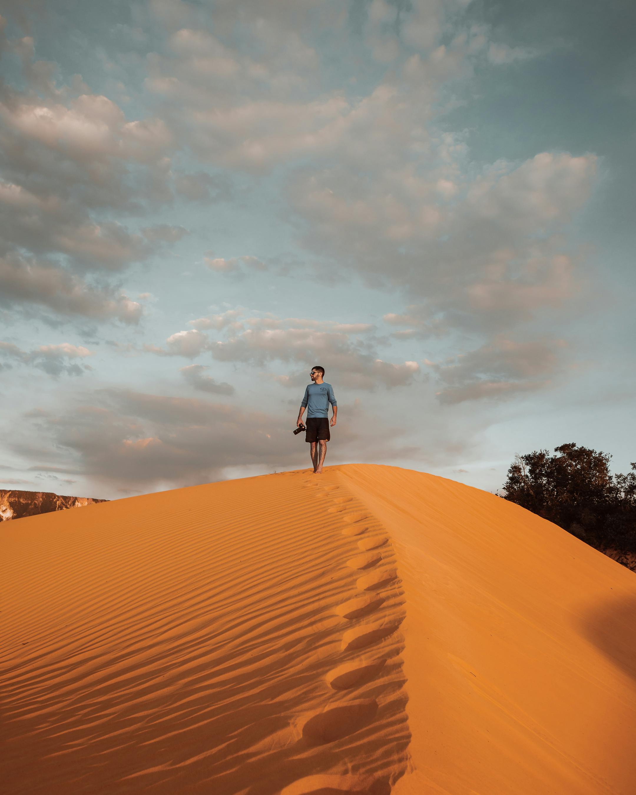Man Walking in the Sand Storm · Free Stock Photo