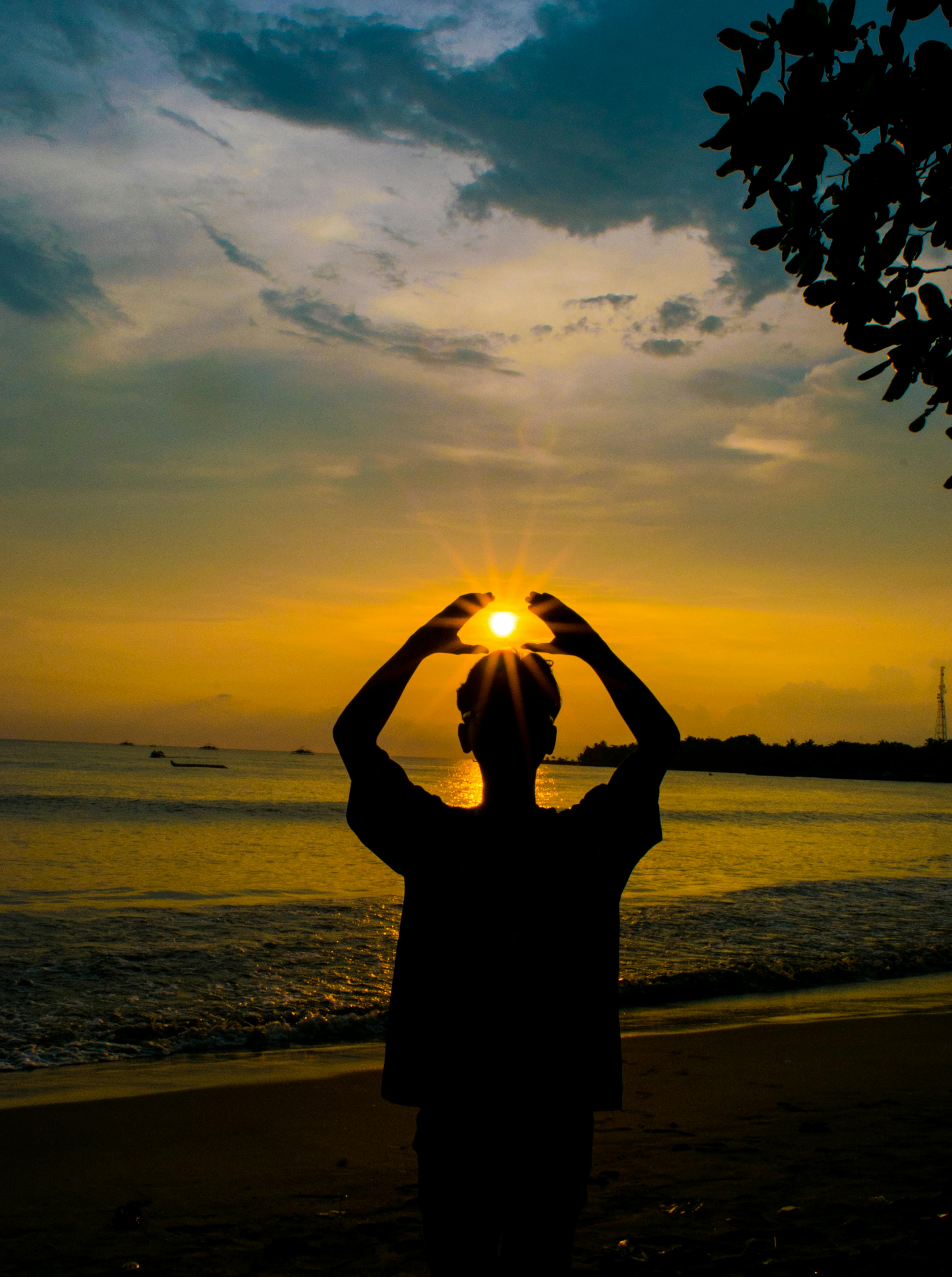 Photo of Two Men on Seashore during Sunset · Free Stock Photo