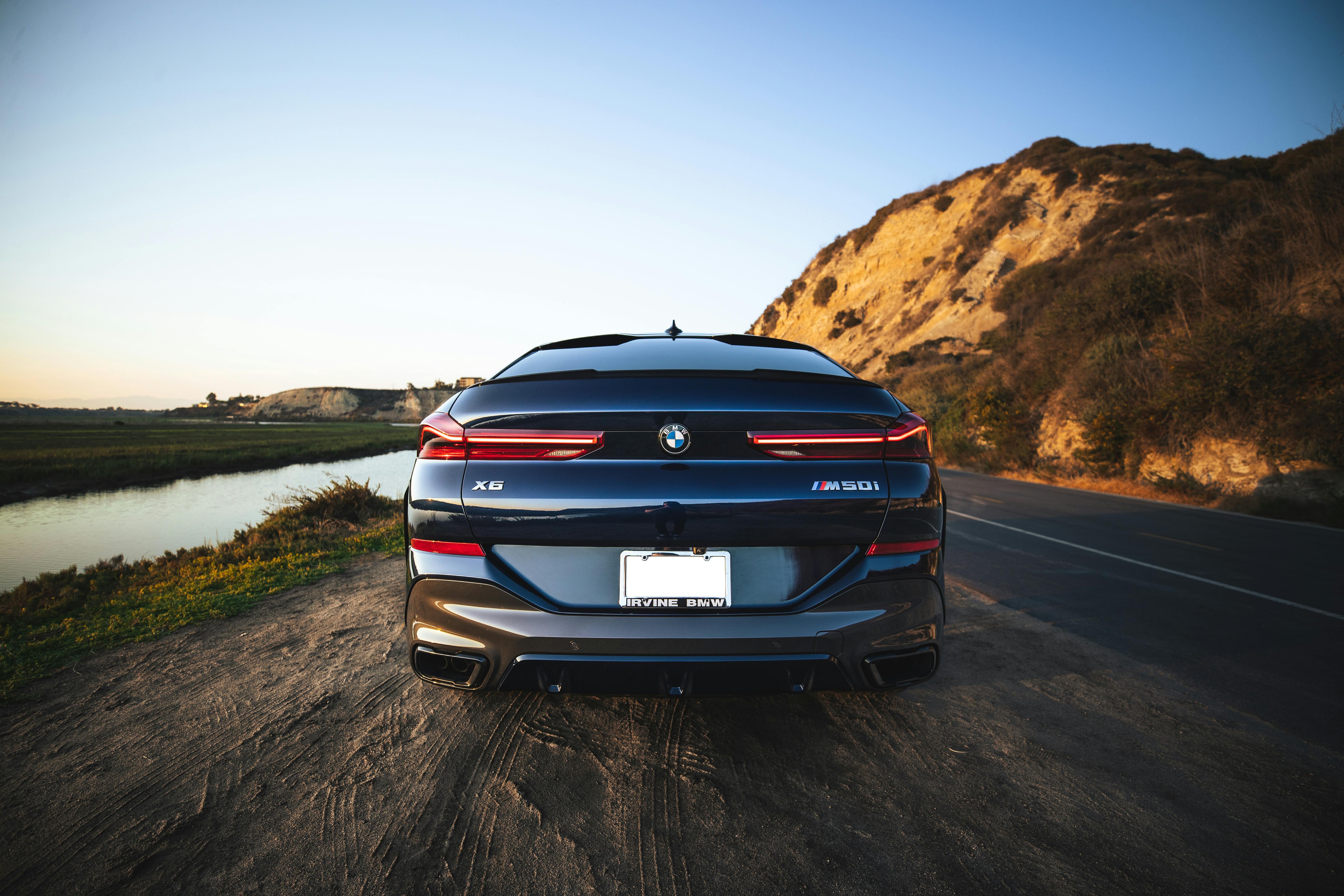 A Black BMW at the Side of the Road · Free Stock Photo