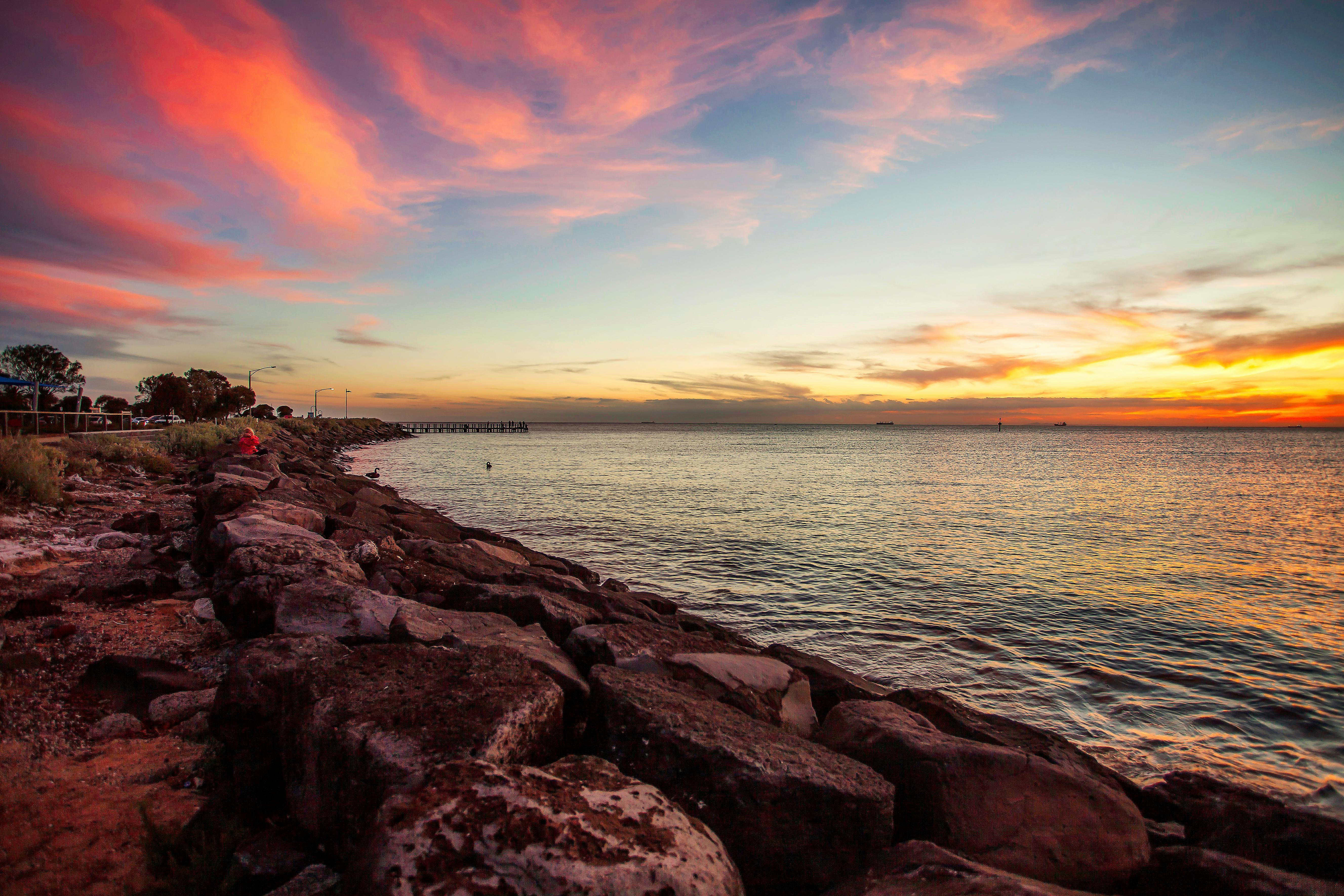 Scenic View Of Ocean During Dawn · Free Stock Photo