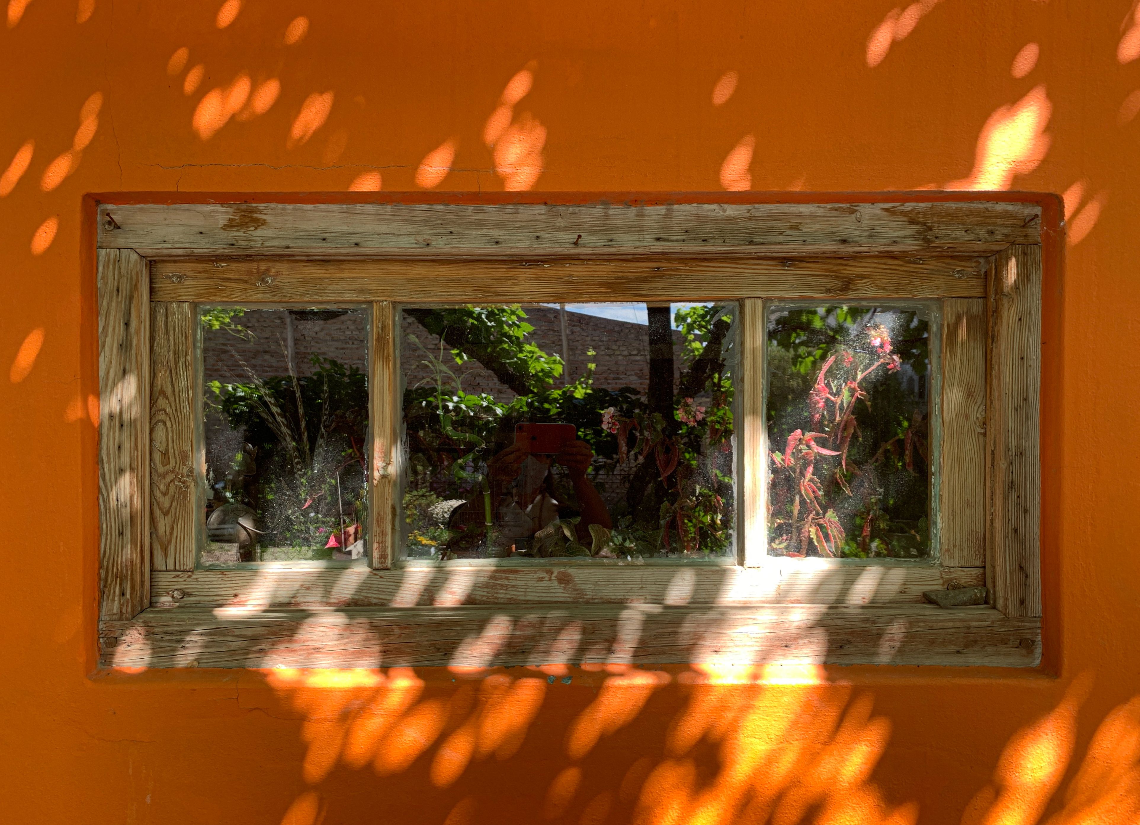 Wooden Framed Window in Orange Wall · Free Stock Photo