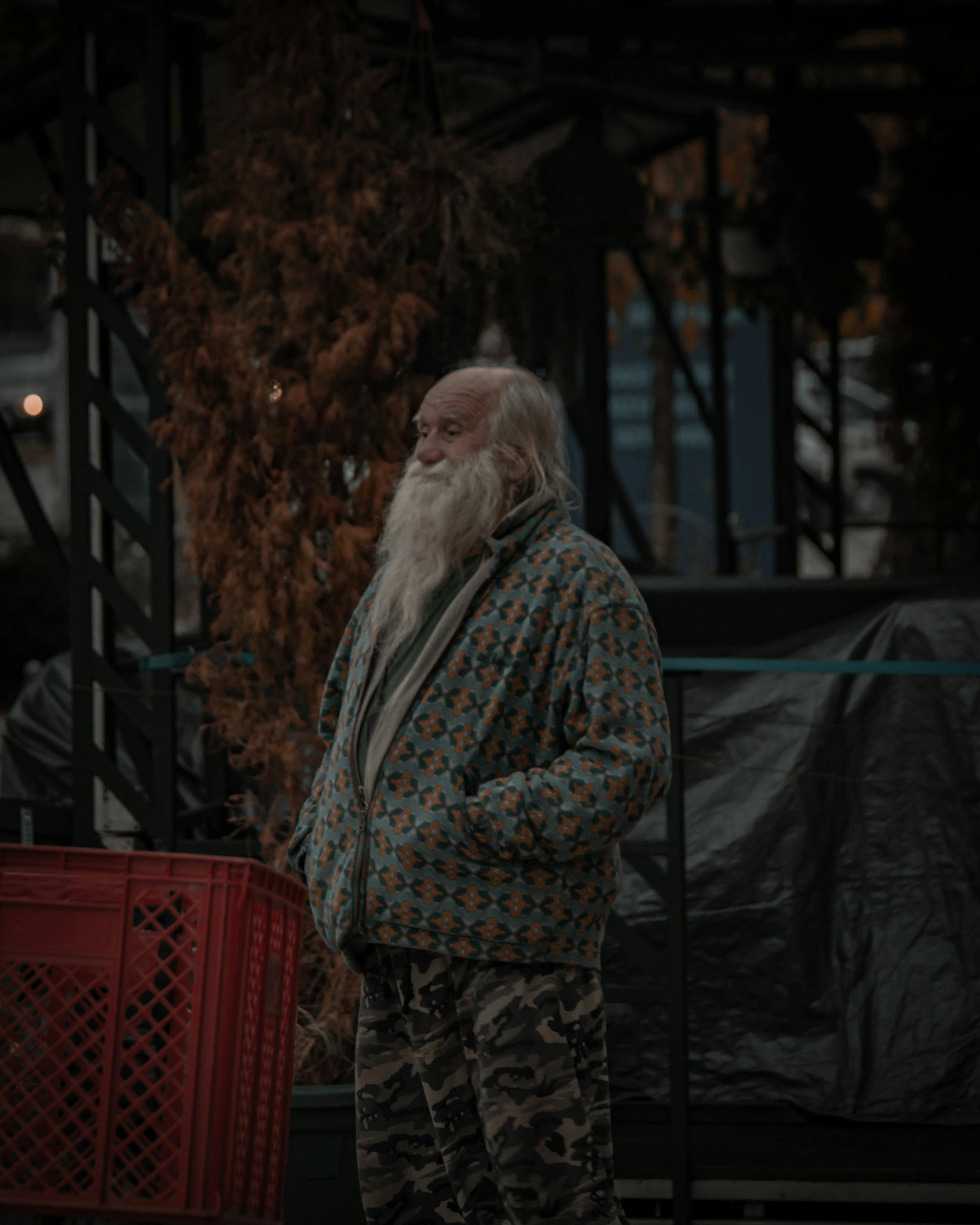 A Man Rubbing the Palms of His Hands · Free Stock Photo