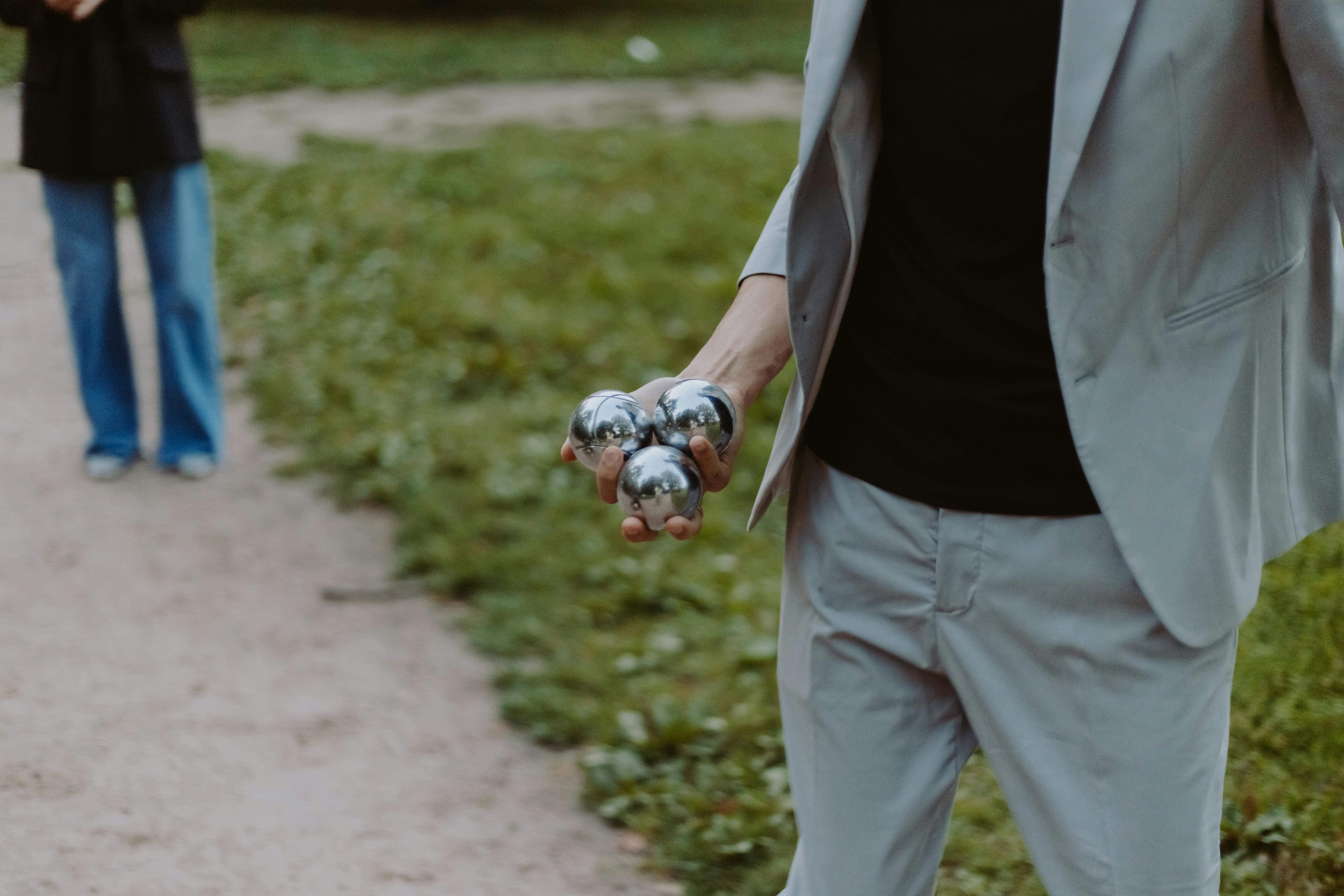 A Person Holding Round Stainless Item · Free Stock Photo