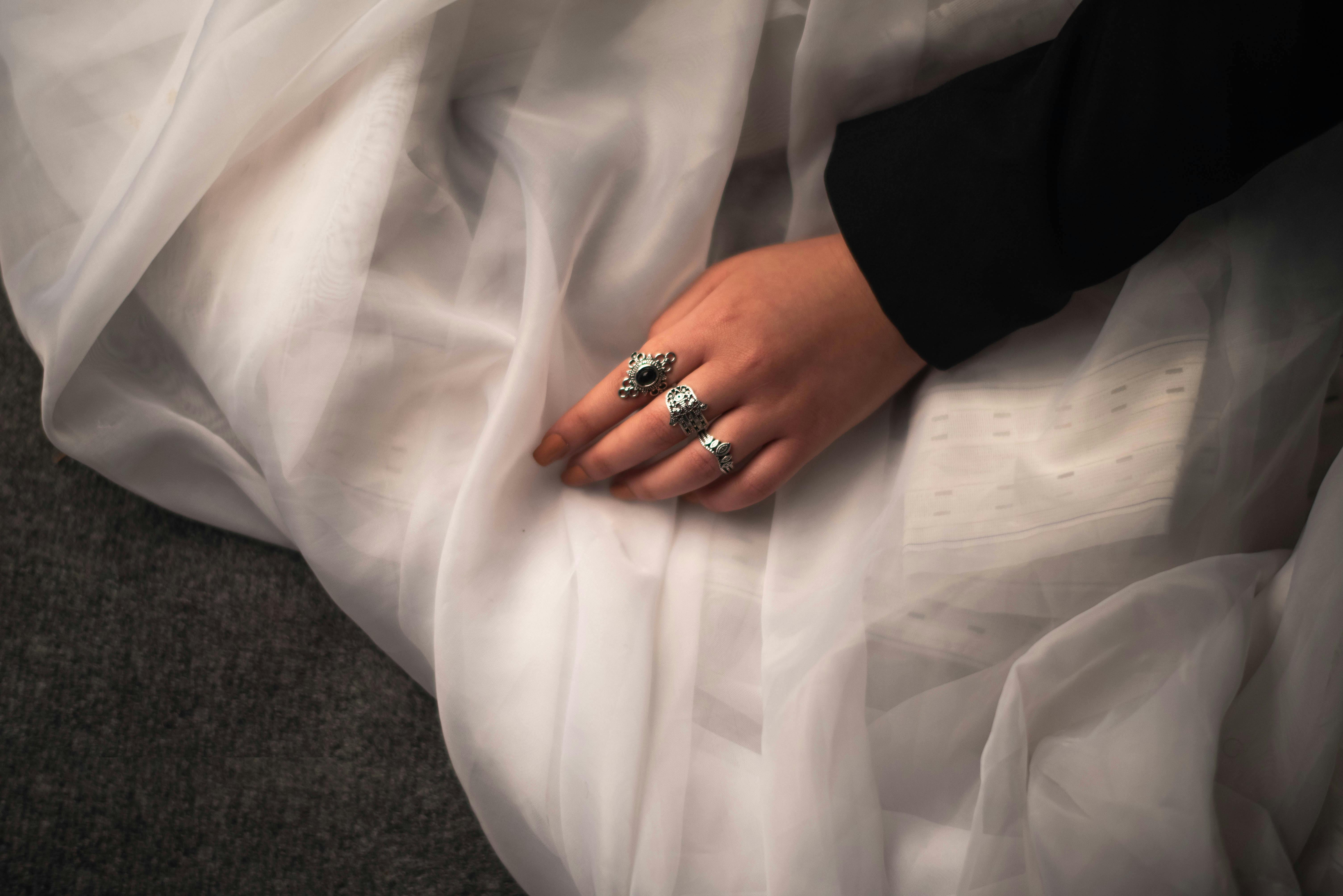 Hand with Silver Rings · Free Stock Photo