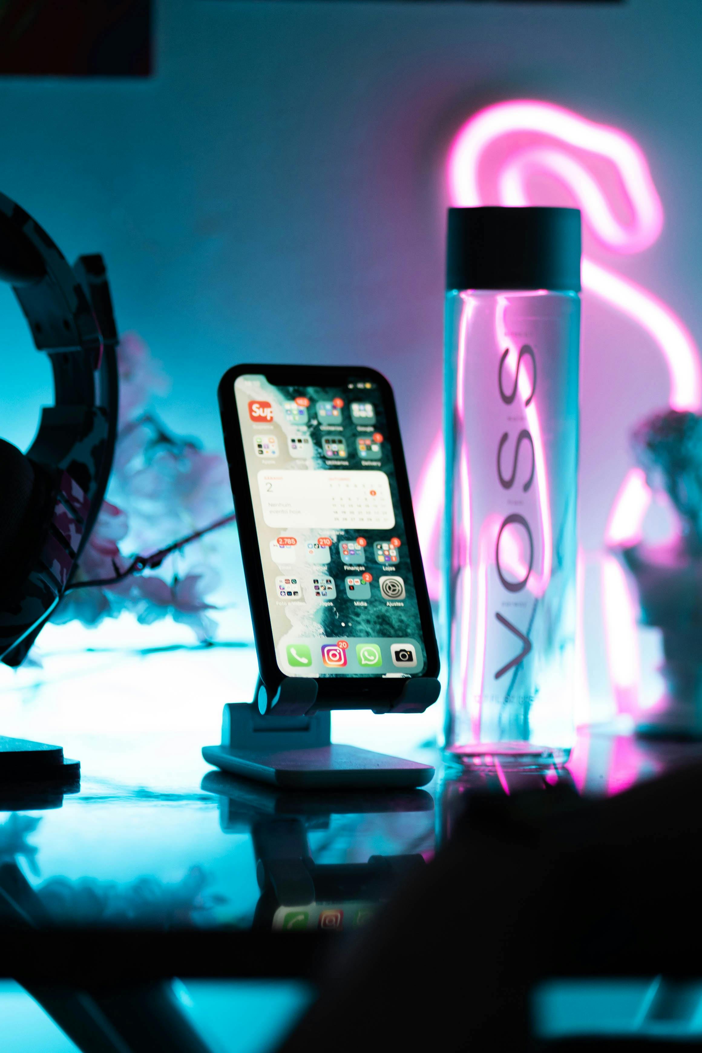Smartphone Around Neon Lights · Free Stock Photo