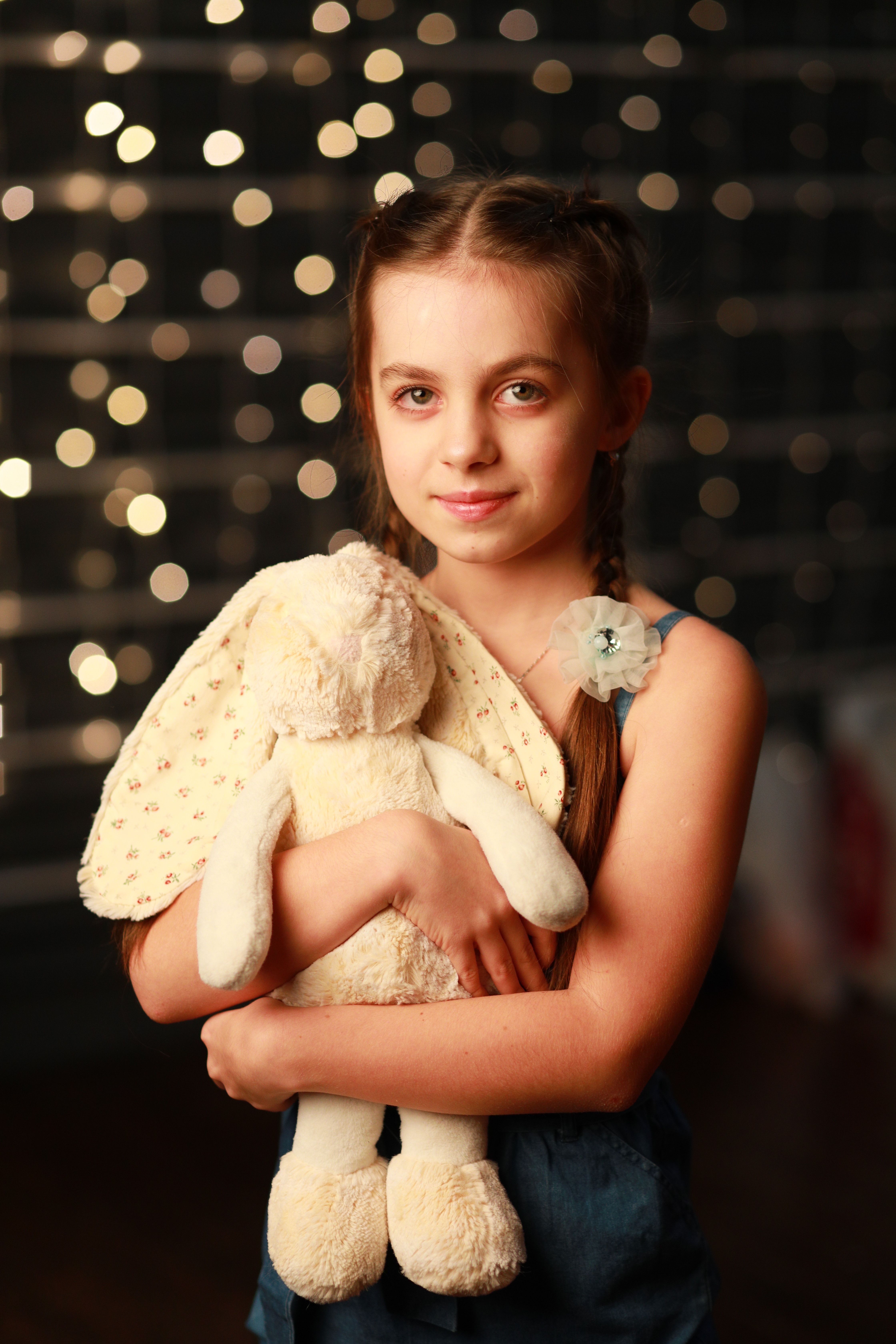 Girl Hugging Stuffed Toy · Free Stock Photo