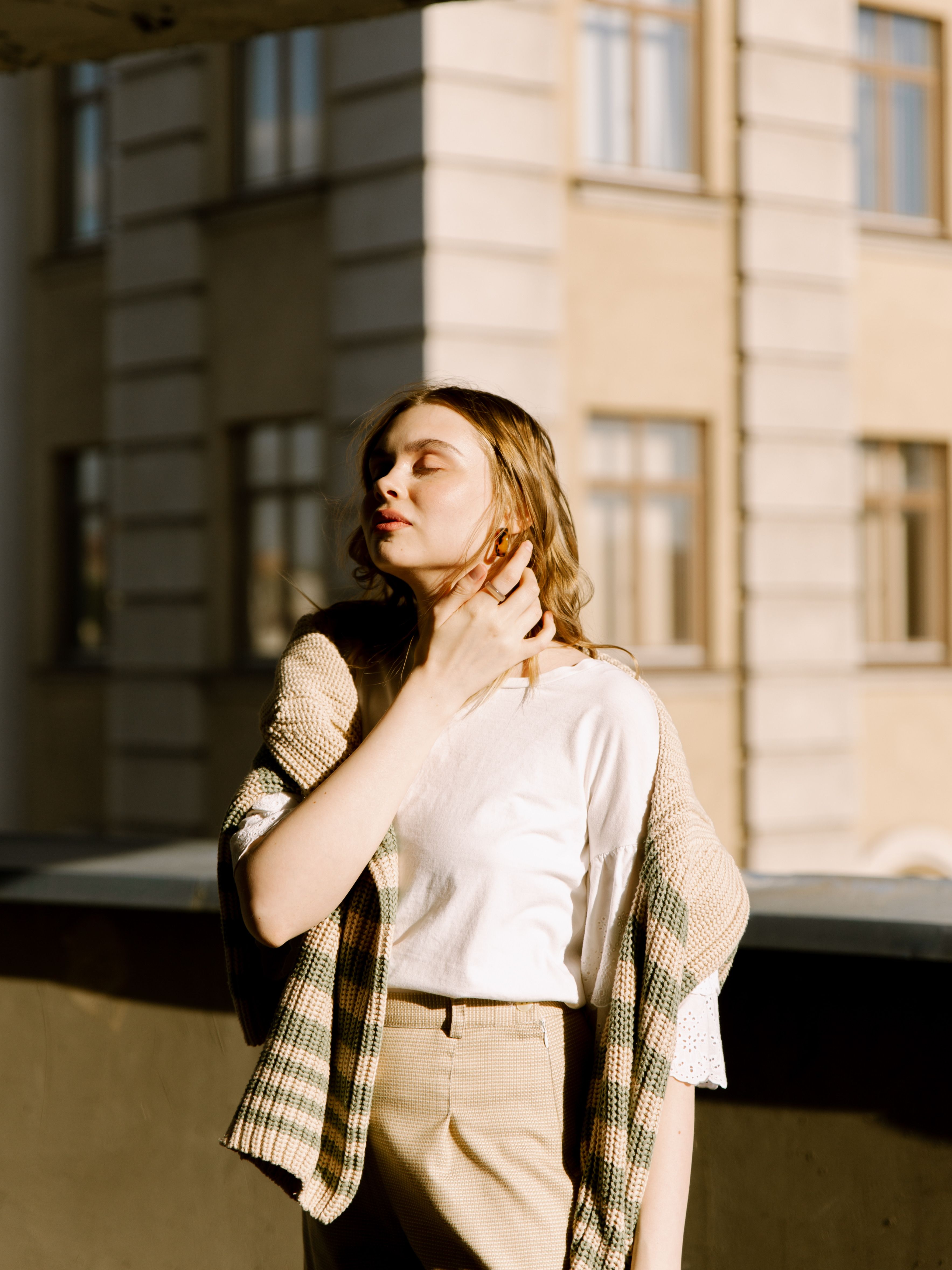 Woman Daydreaming with Eyes Closed · Free Stock Photo