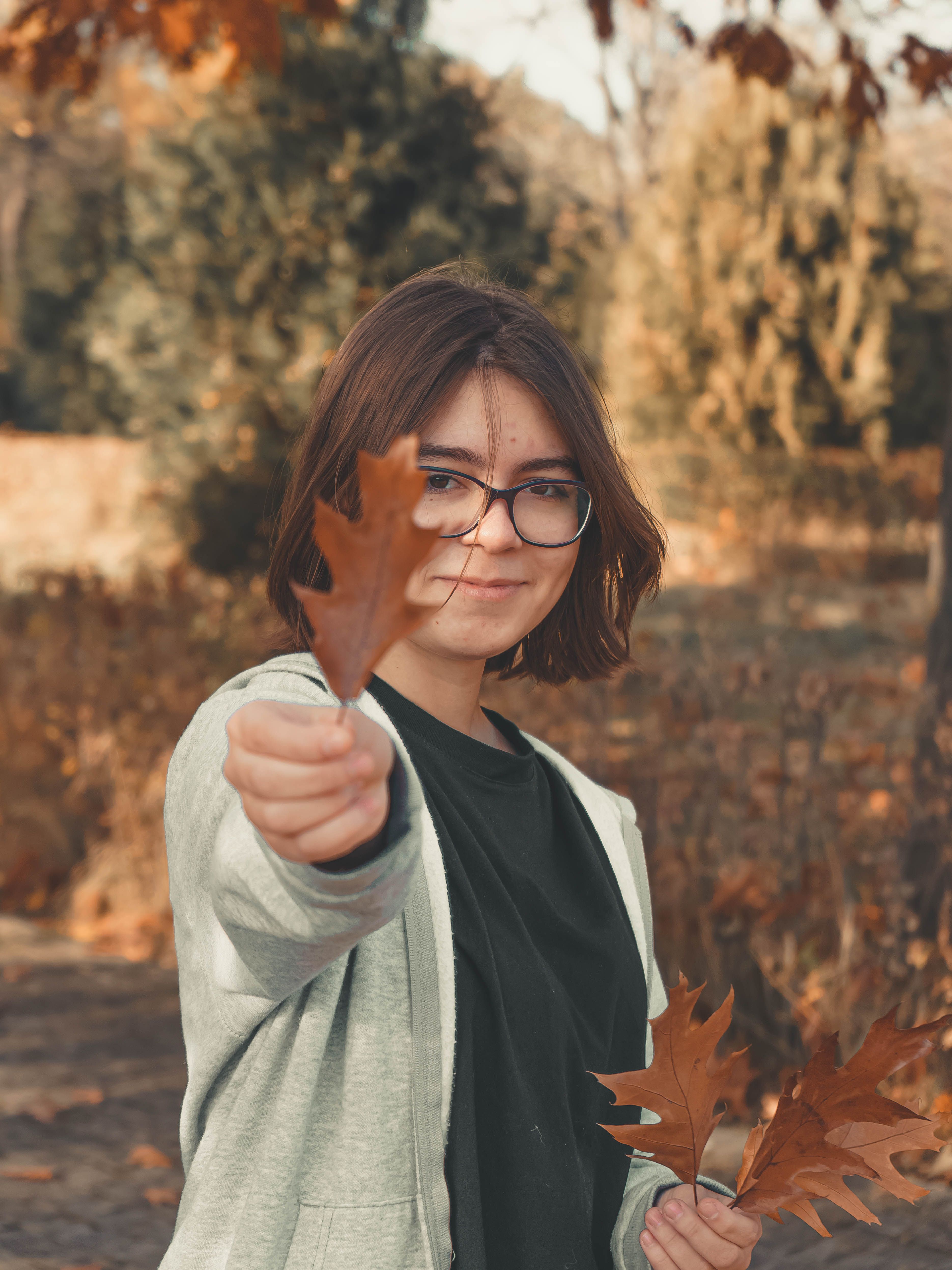 Close Up of Hand Holding Leaf · Free Stock Photo