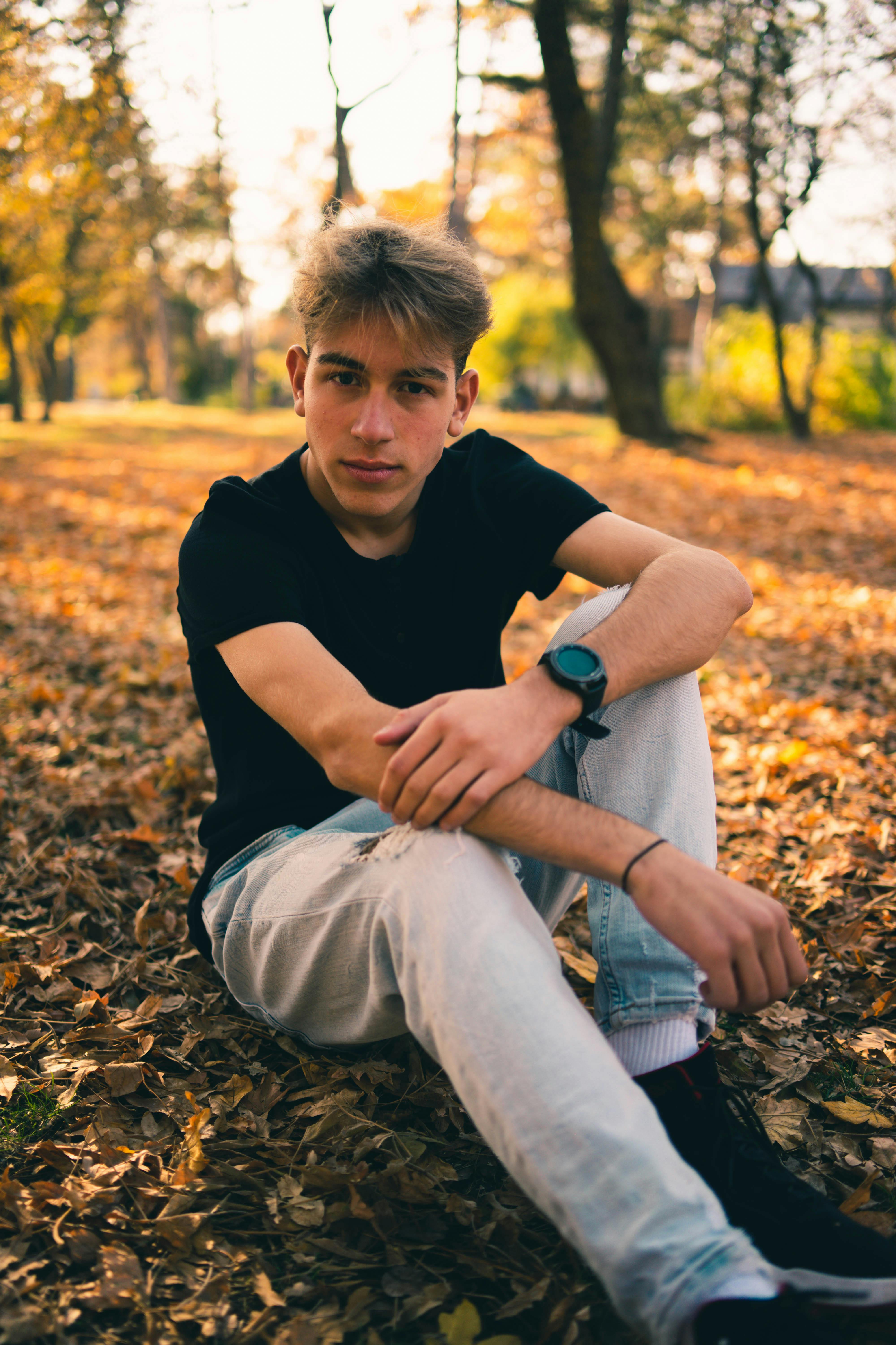 Man Sitting in Forest · Free Stock Photo