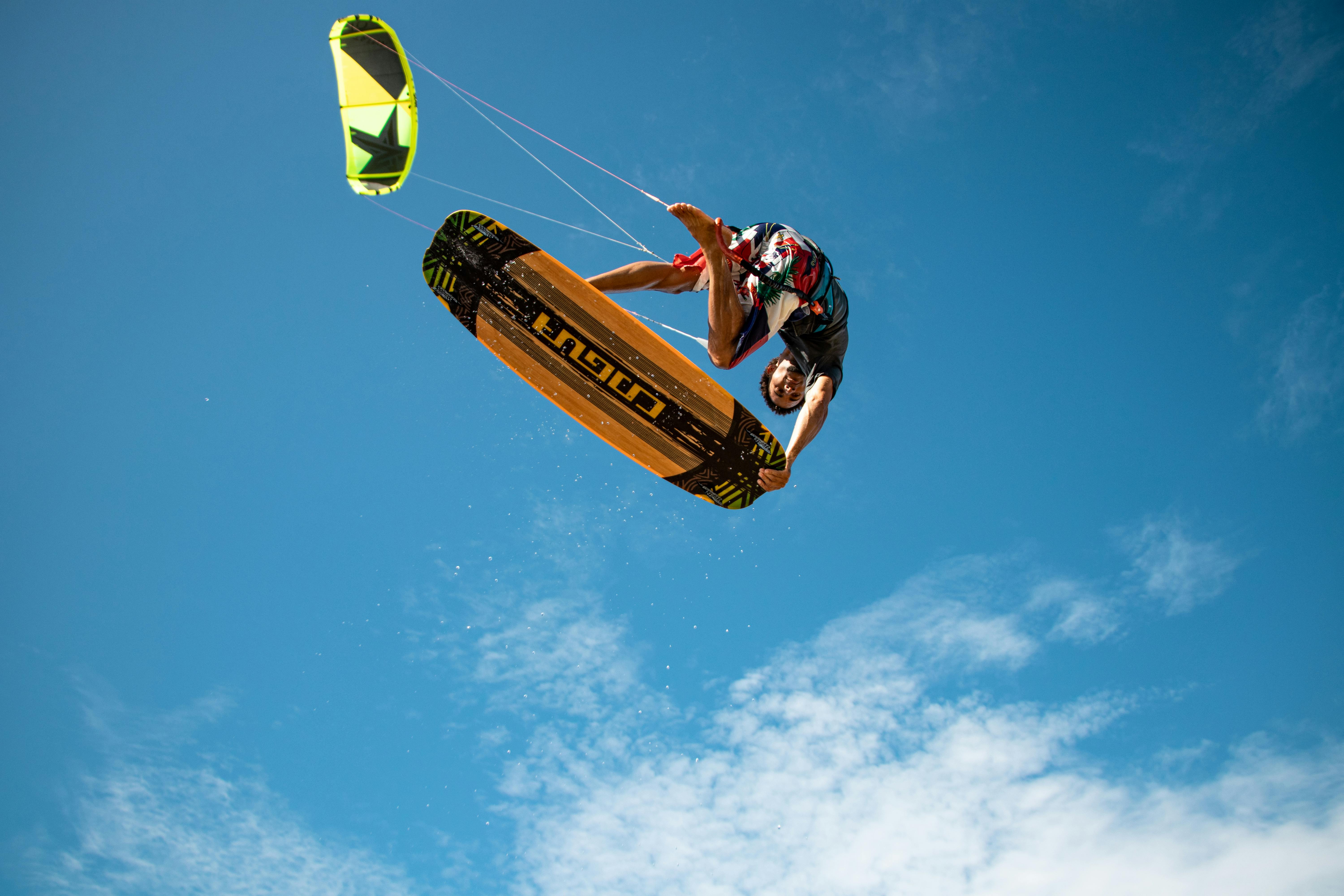 Multi Colored Kites Flying against Clear Sky · Free Stock Photo