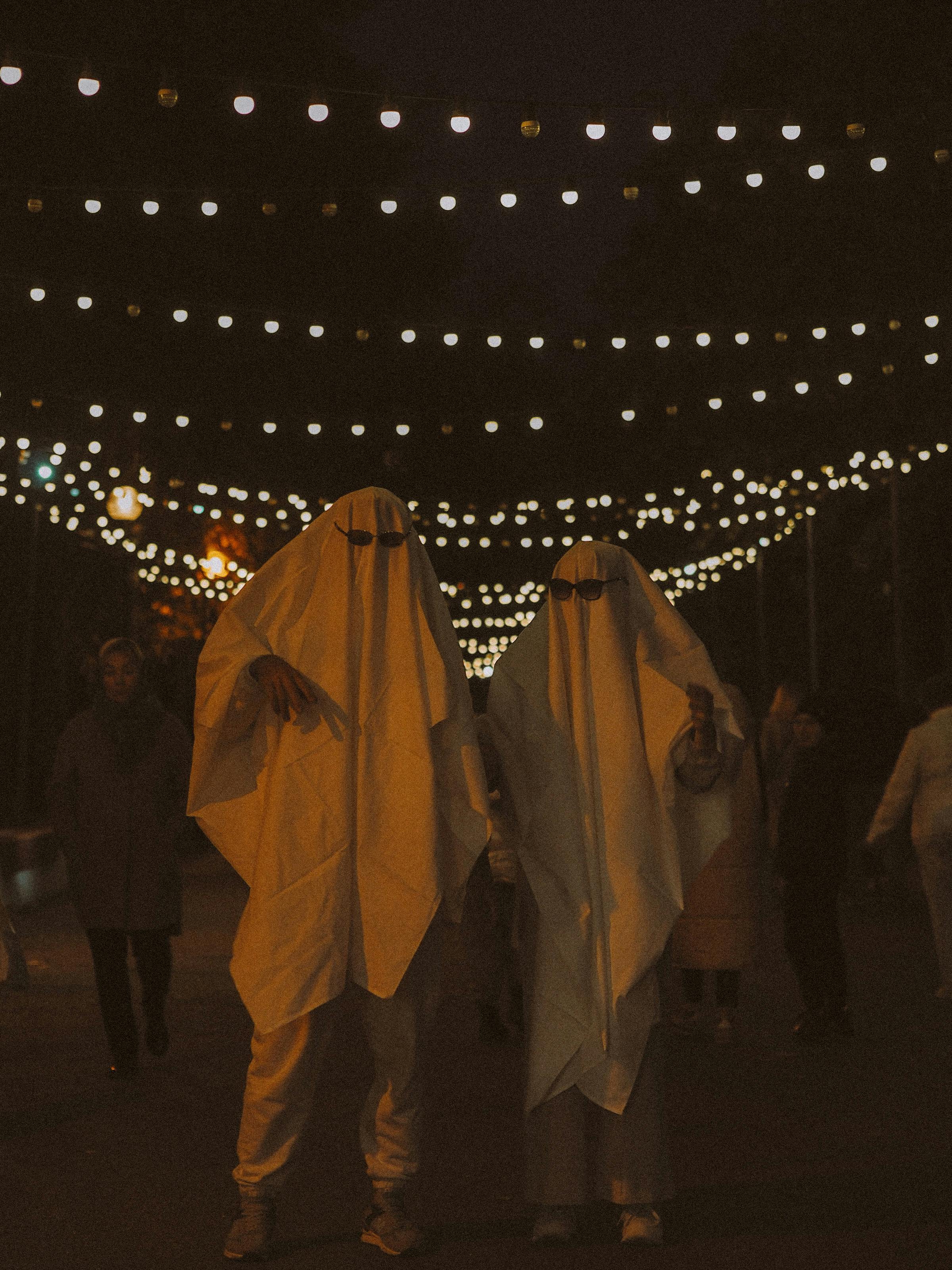 People in Ghosts Costumes · Free Stock Photo