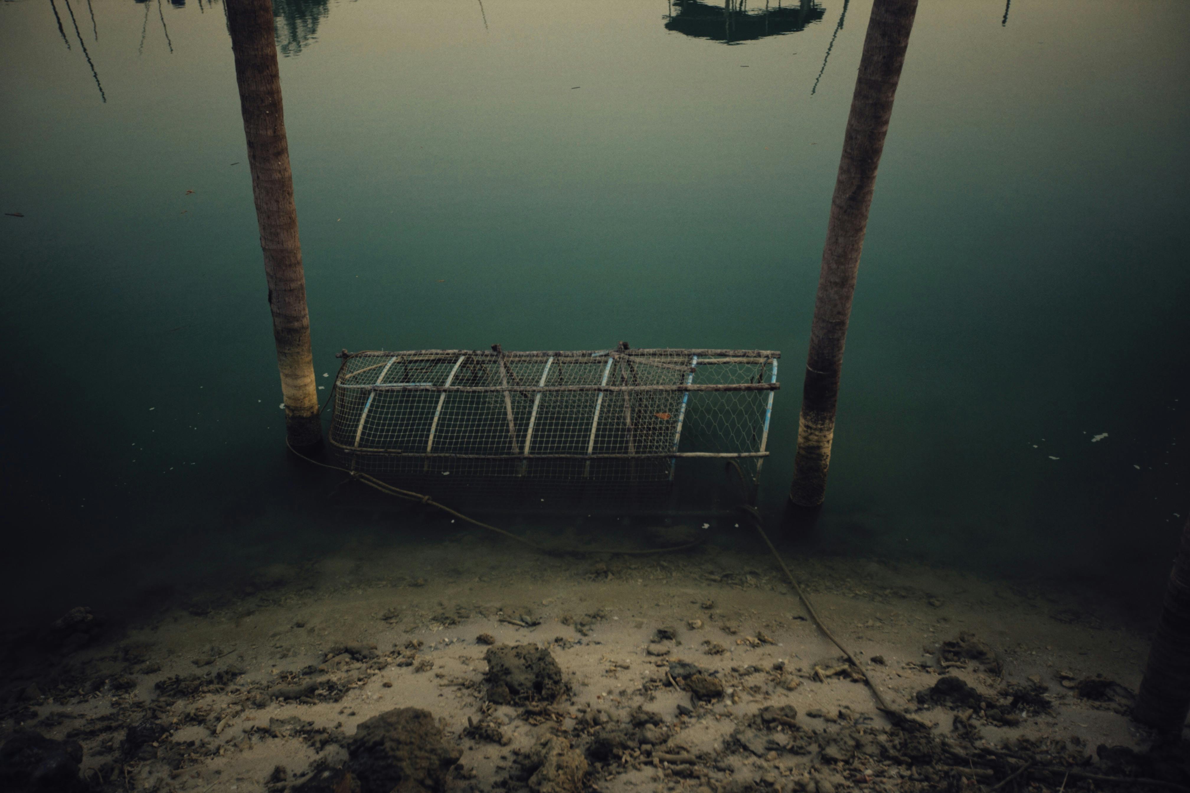 Stacks of Empty Fish Traps Standing Outdoors · Free Stock Photo