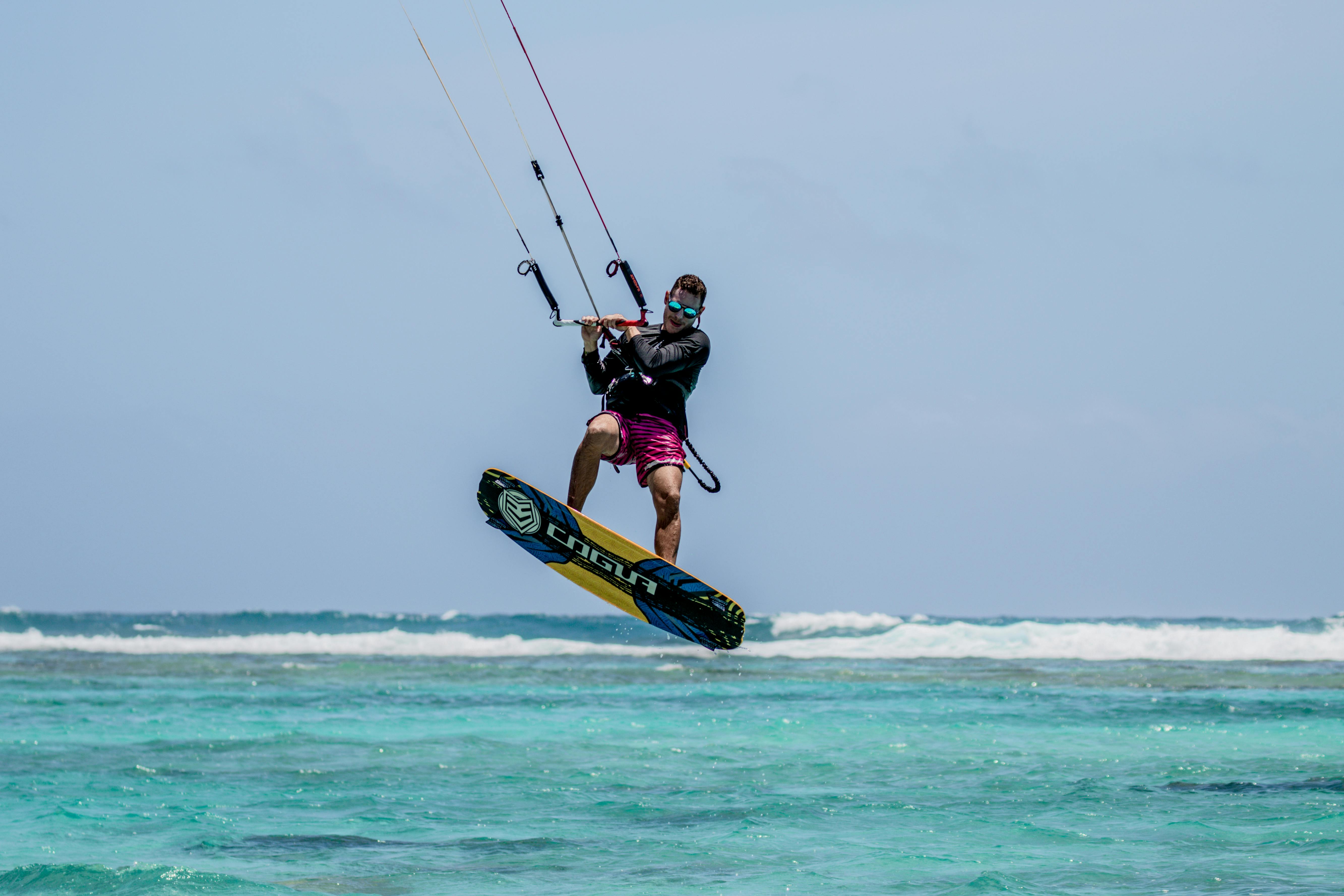 Person Jumping a Wakeboard on the Lake · Free Stock Photo