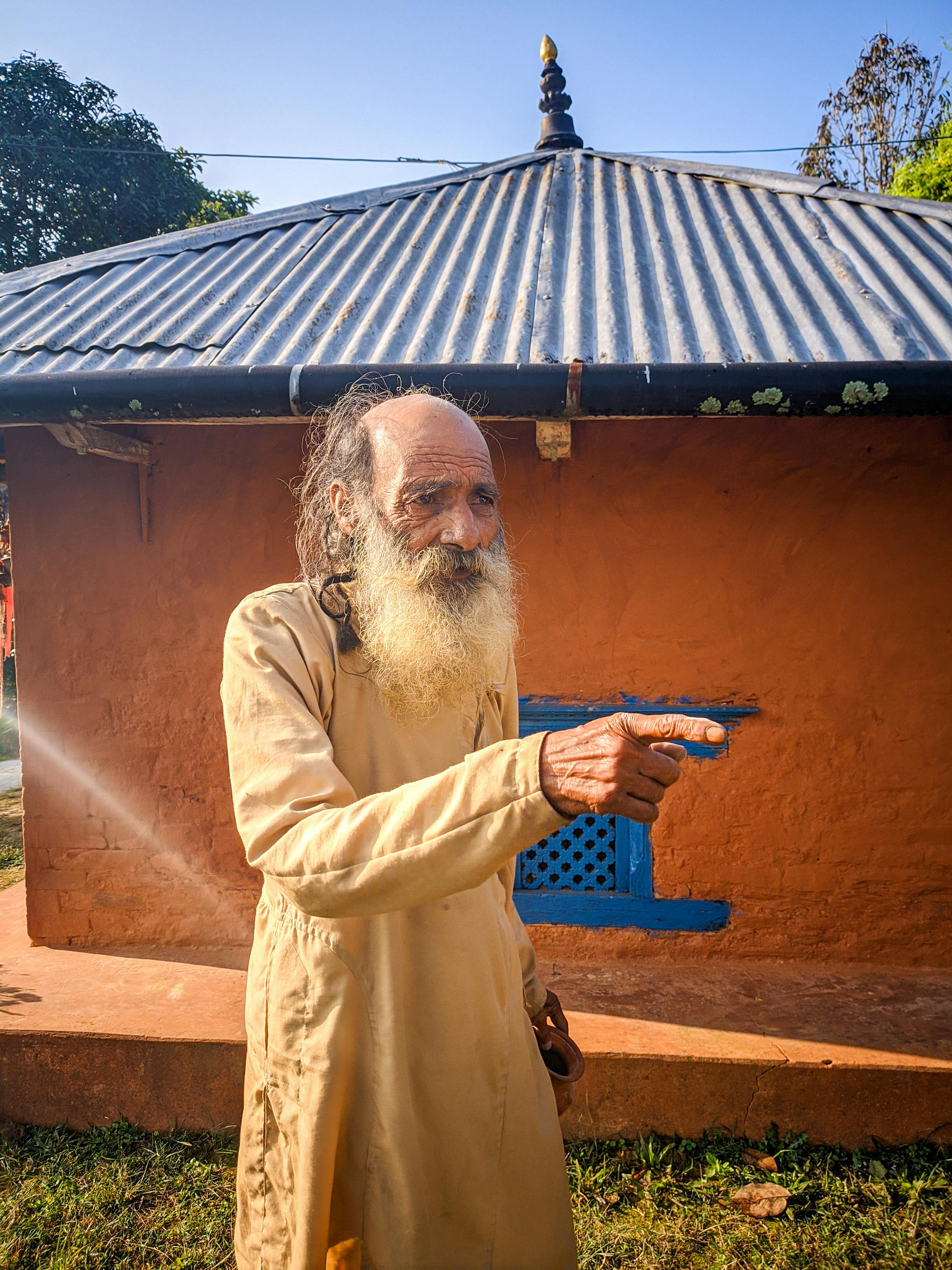 A Man in a Trench Coat Holding a Handbag Running · Free Stock Photo