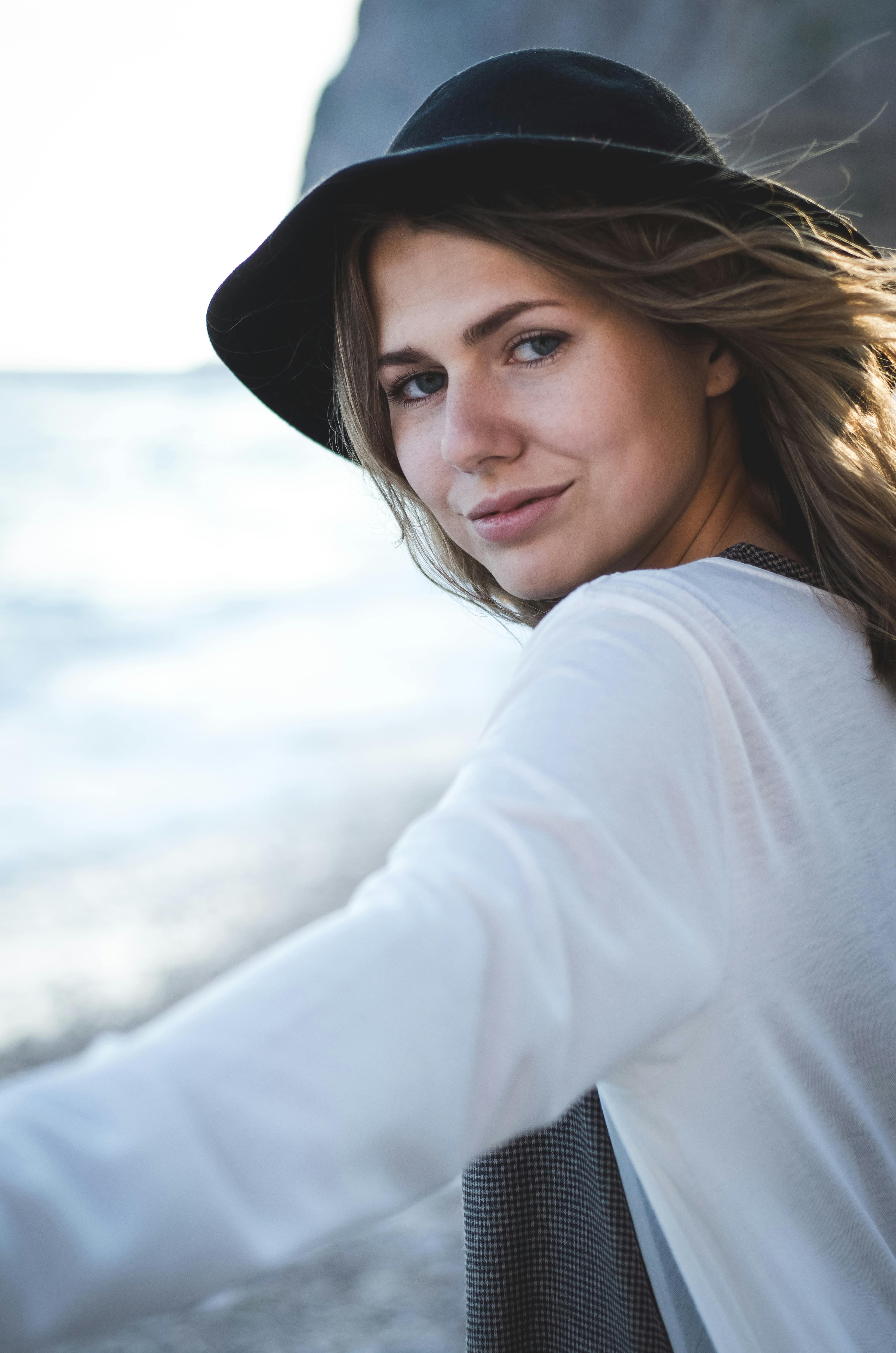 Woman with Unusual Toadstool Hat · Free Stock Photo