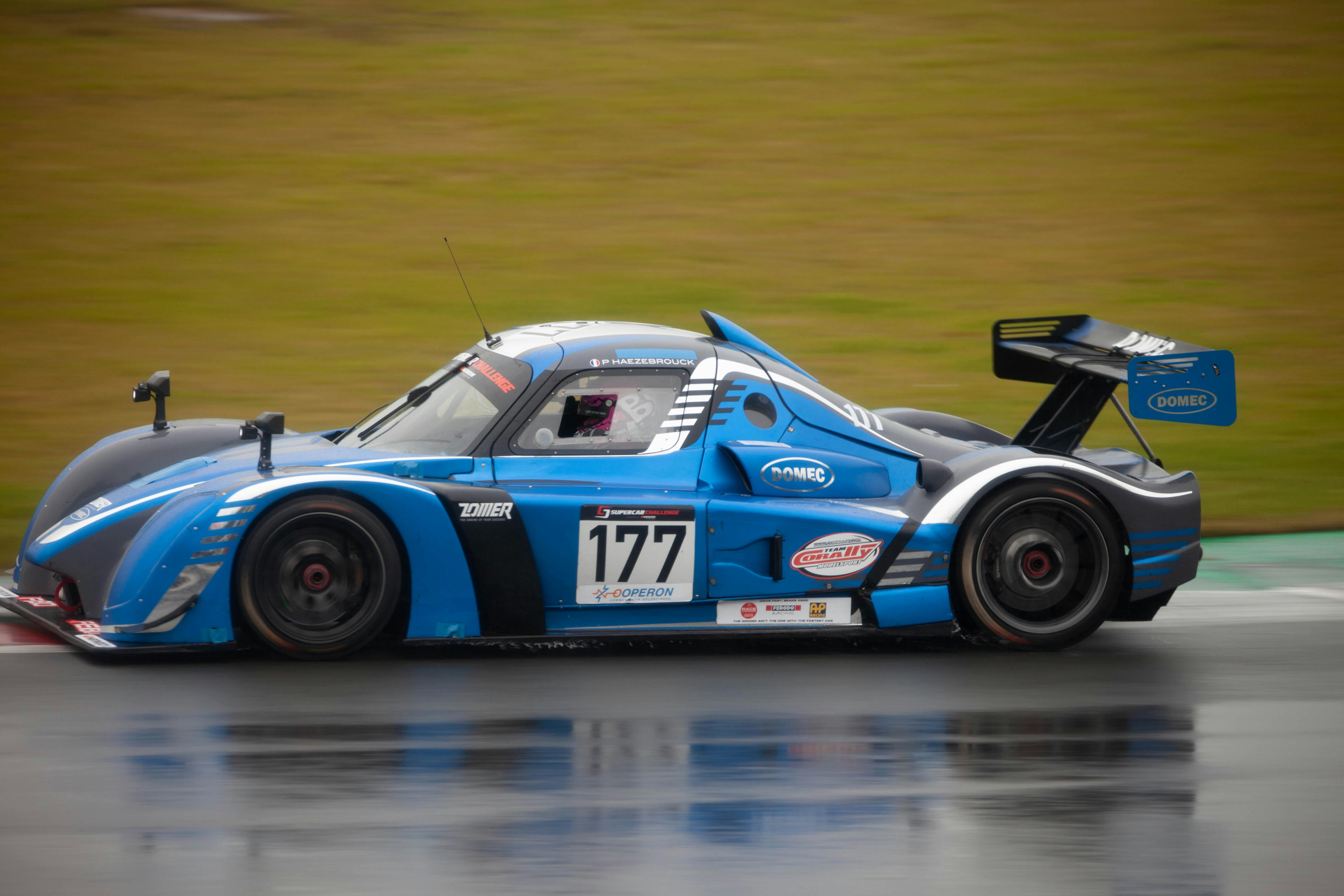 A Sport Car in the Race Track · Free Stock Photo