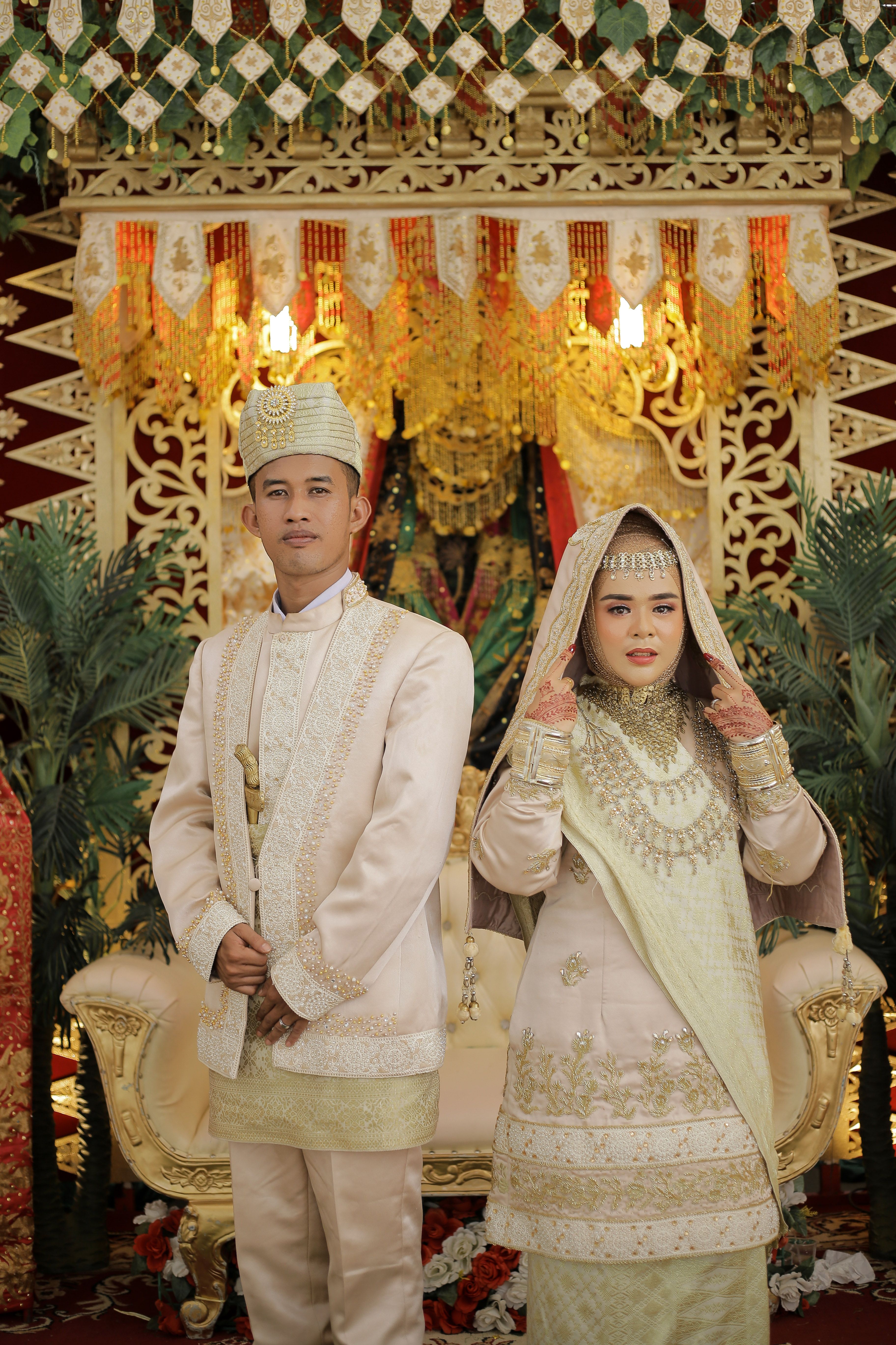 A Newlywed Couple in Traditional Wedding Dress · Free Stock Photo