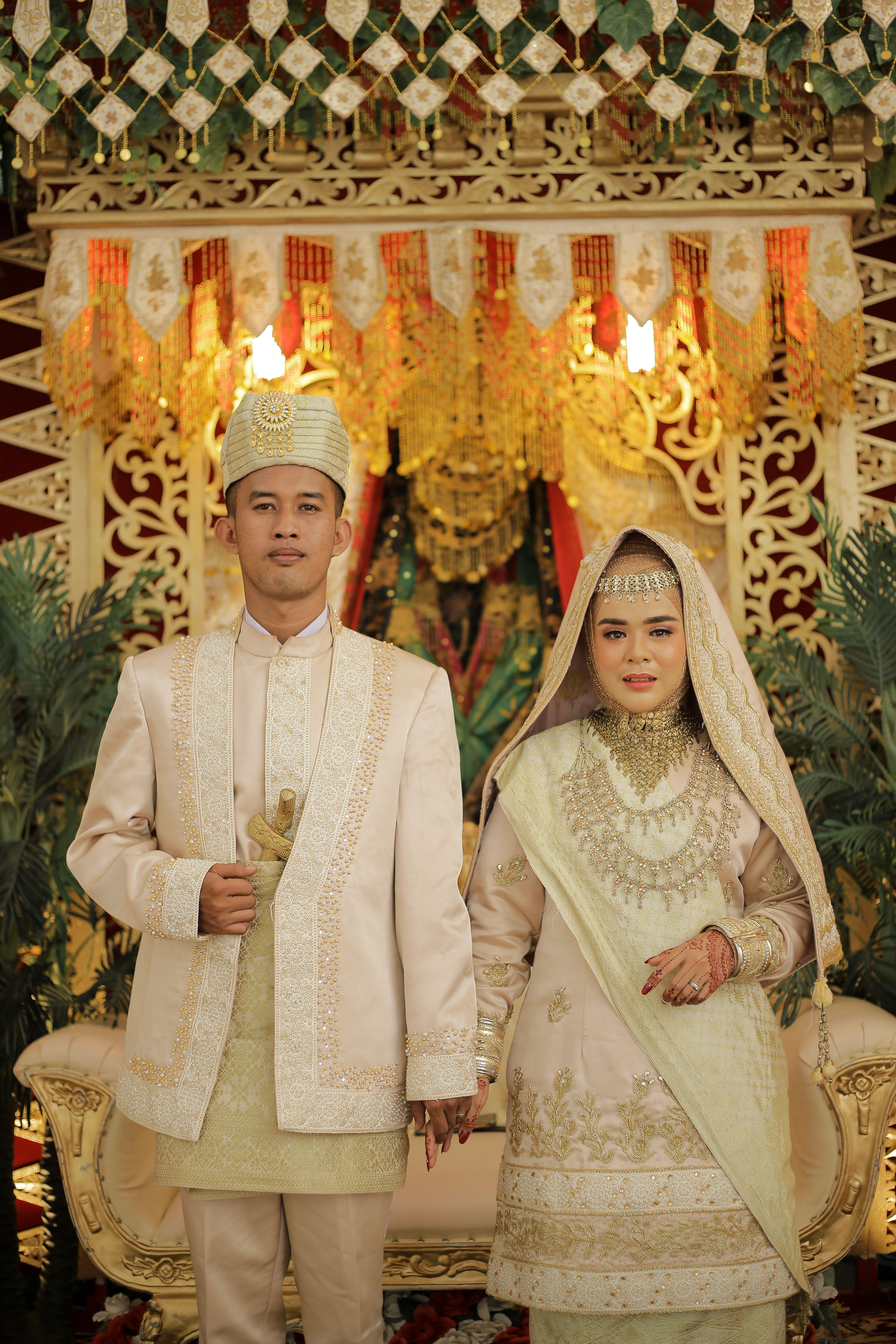 Elegant Groom and Bride in Traditional Clothing · Free Stock Photo