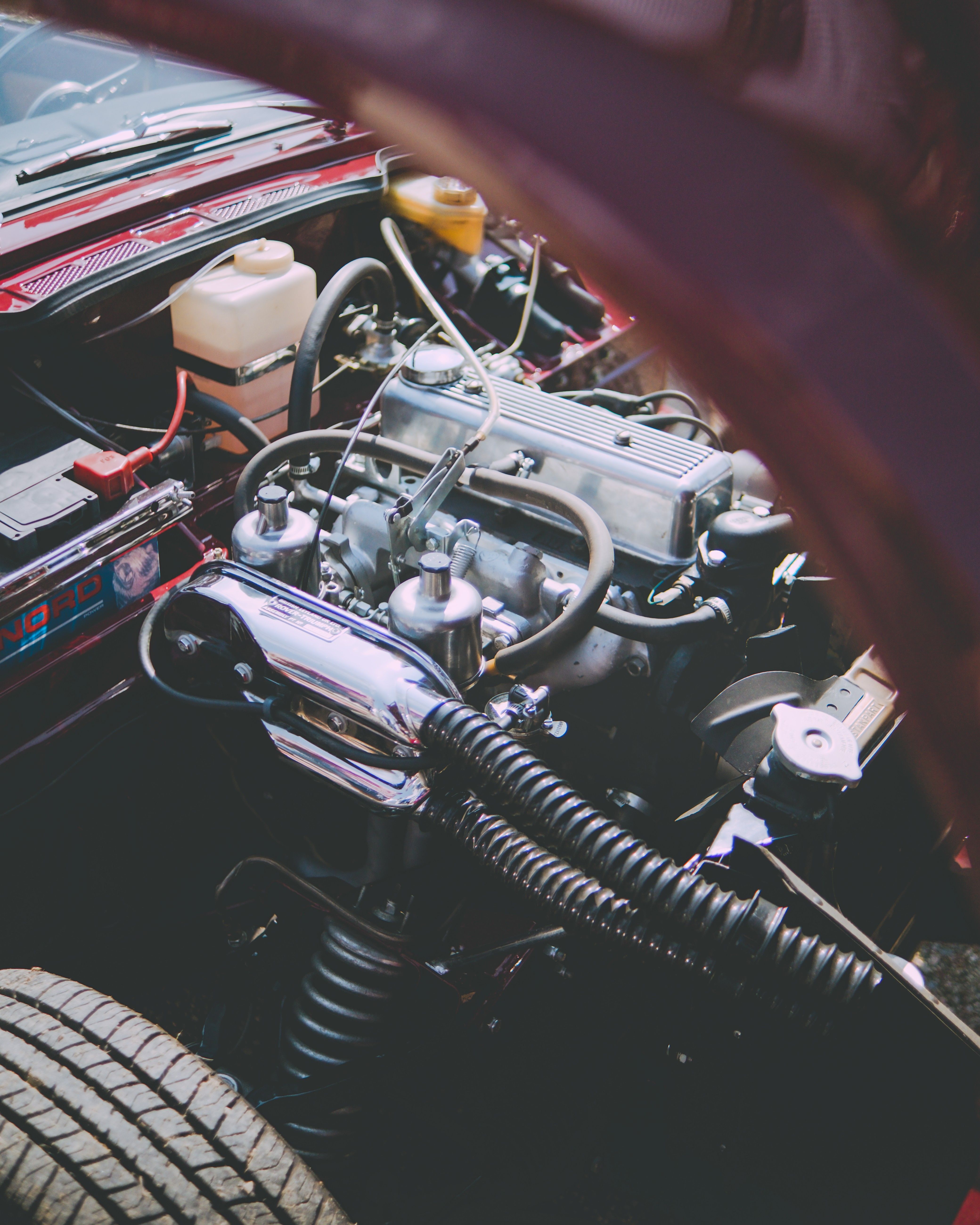 Close-up Shot of a Car Engine · Free Stock Photo