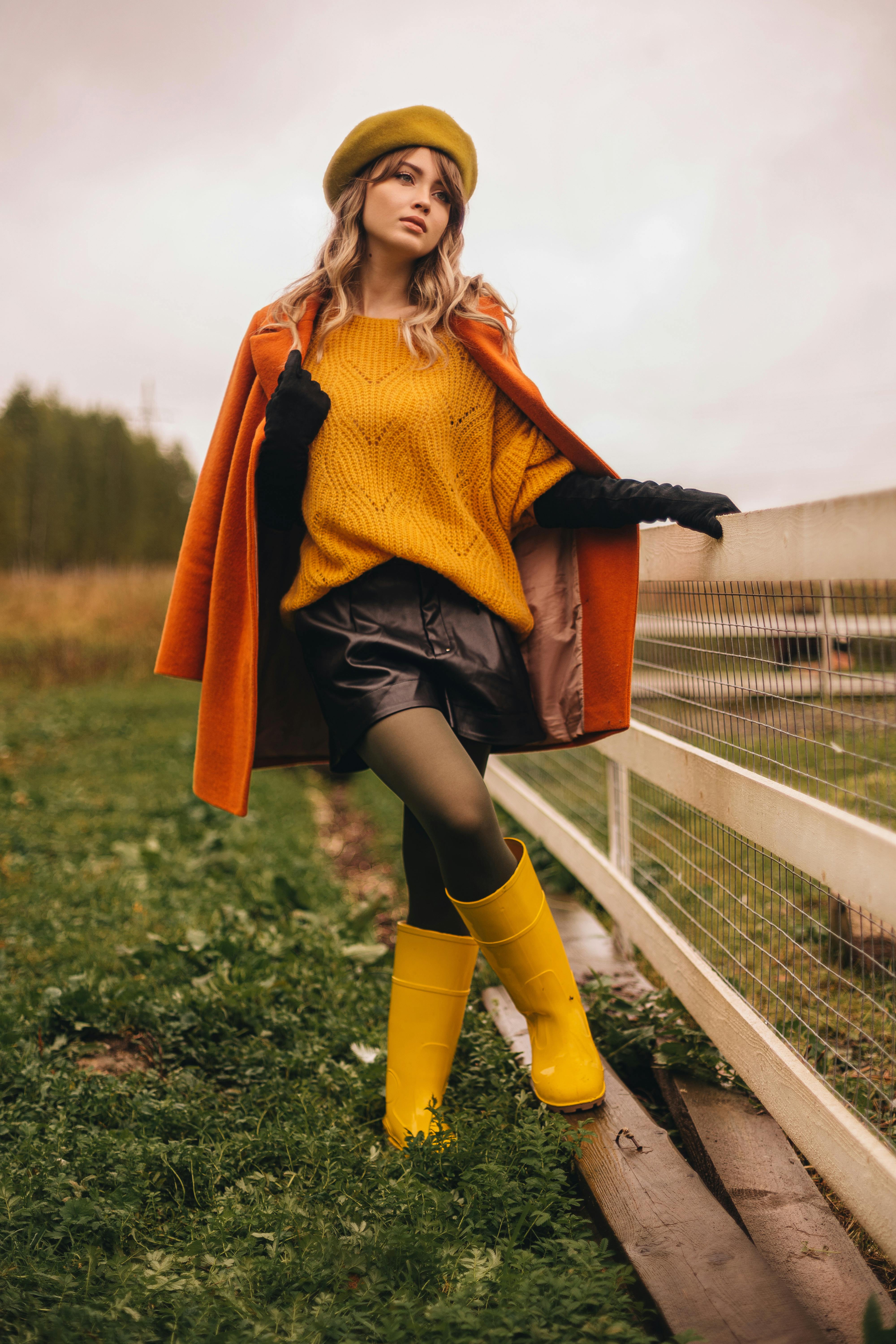 A Female Model Standing Wearing Autumn Style Clothing · Free Stock Photo